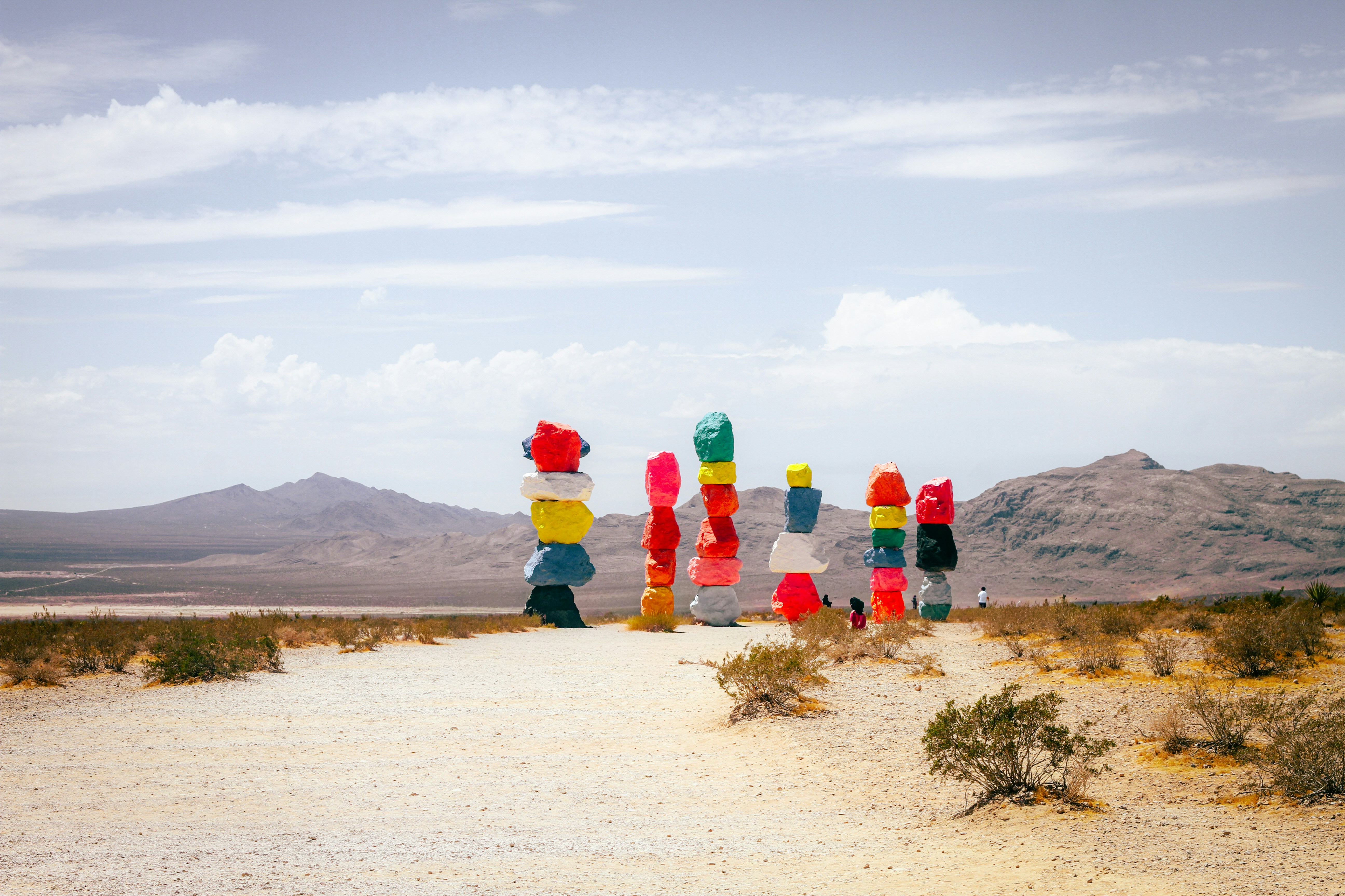 Desert Stack: Colorful Rock Totems Rising from Arid Plain