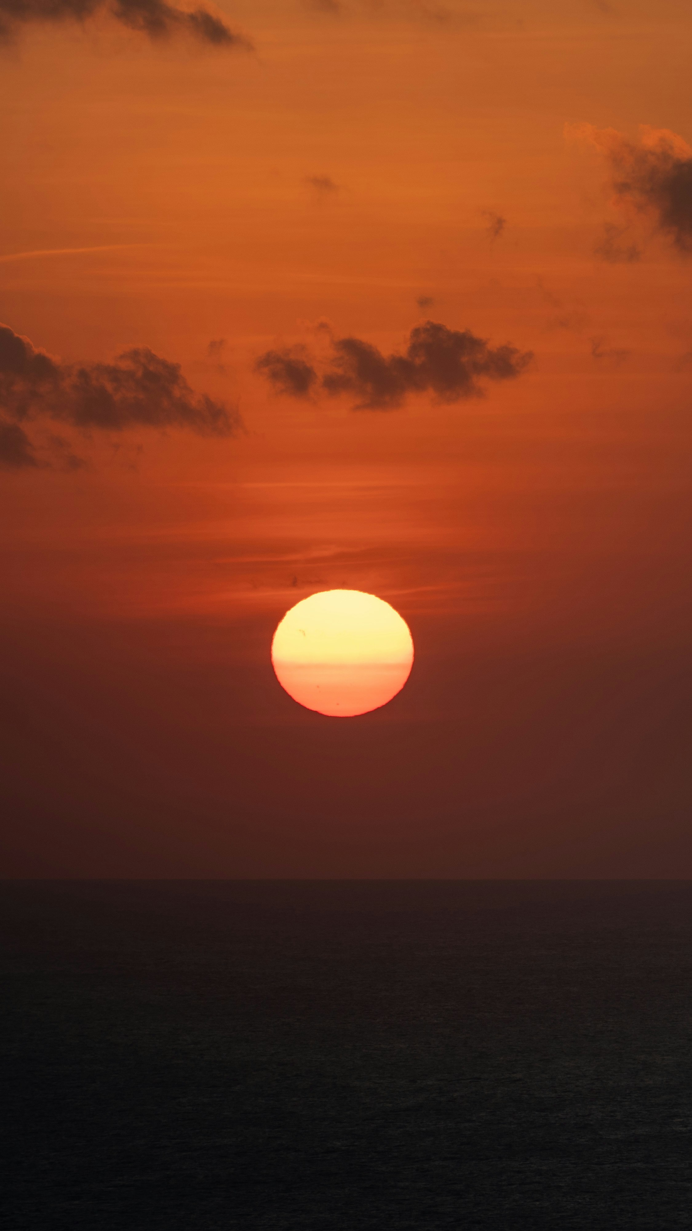 Rising Sun over a Quiet Ocean