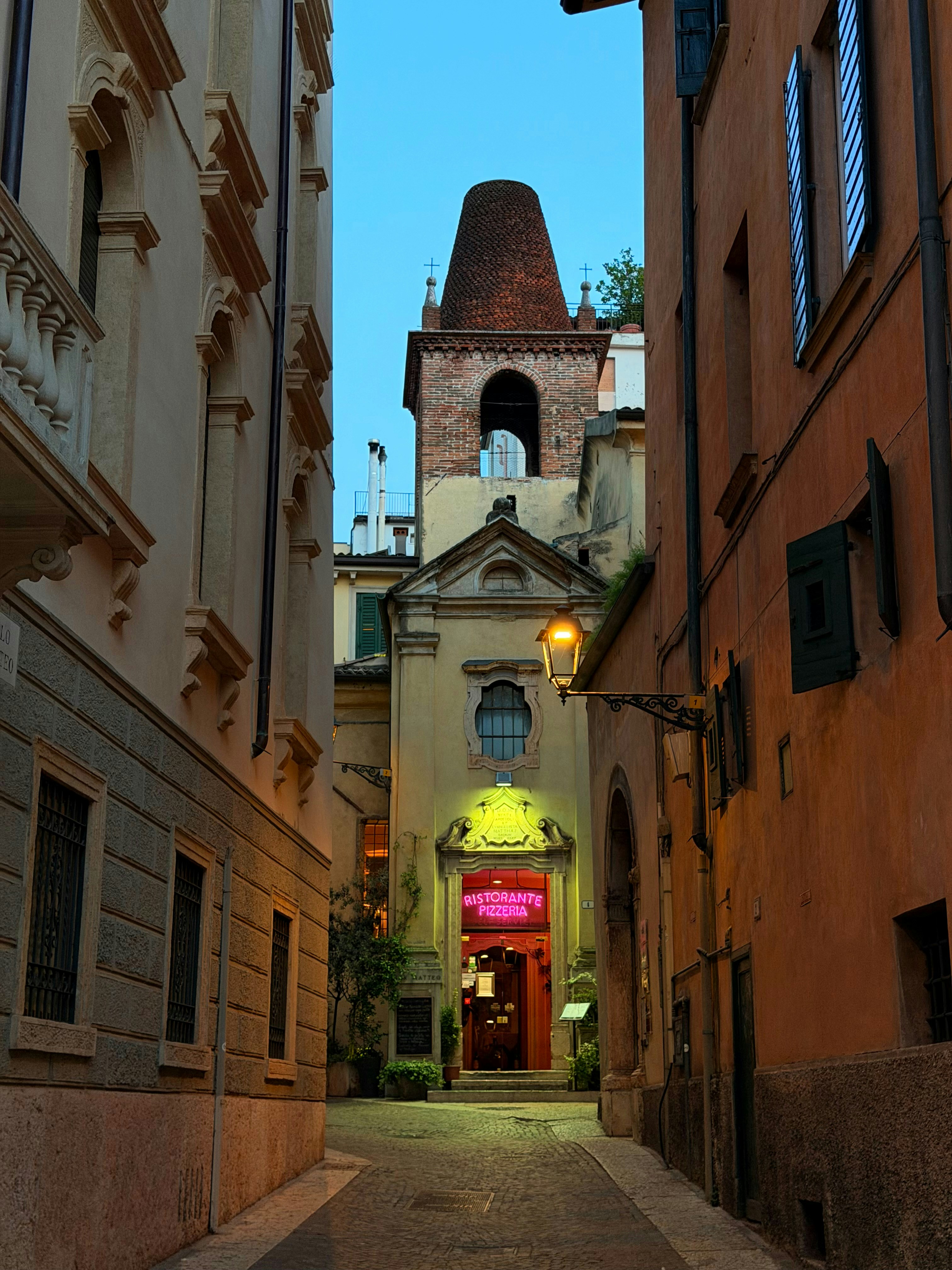Alleyway to the Bell-Tower: A History-Colored Path to a Warm Pizzeria