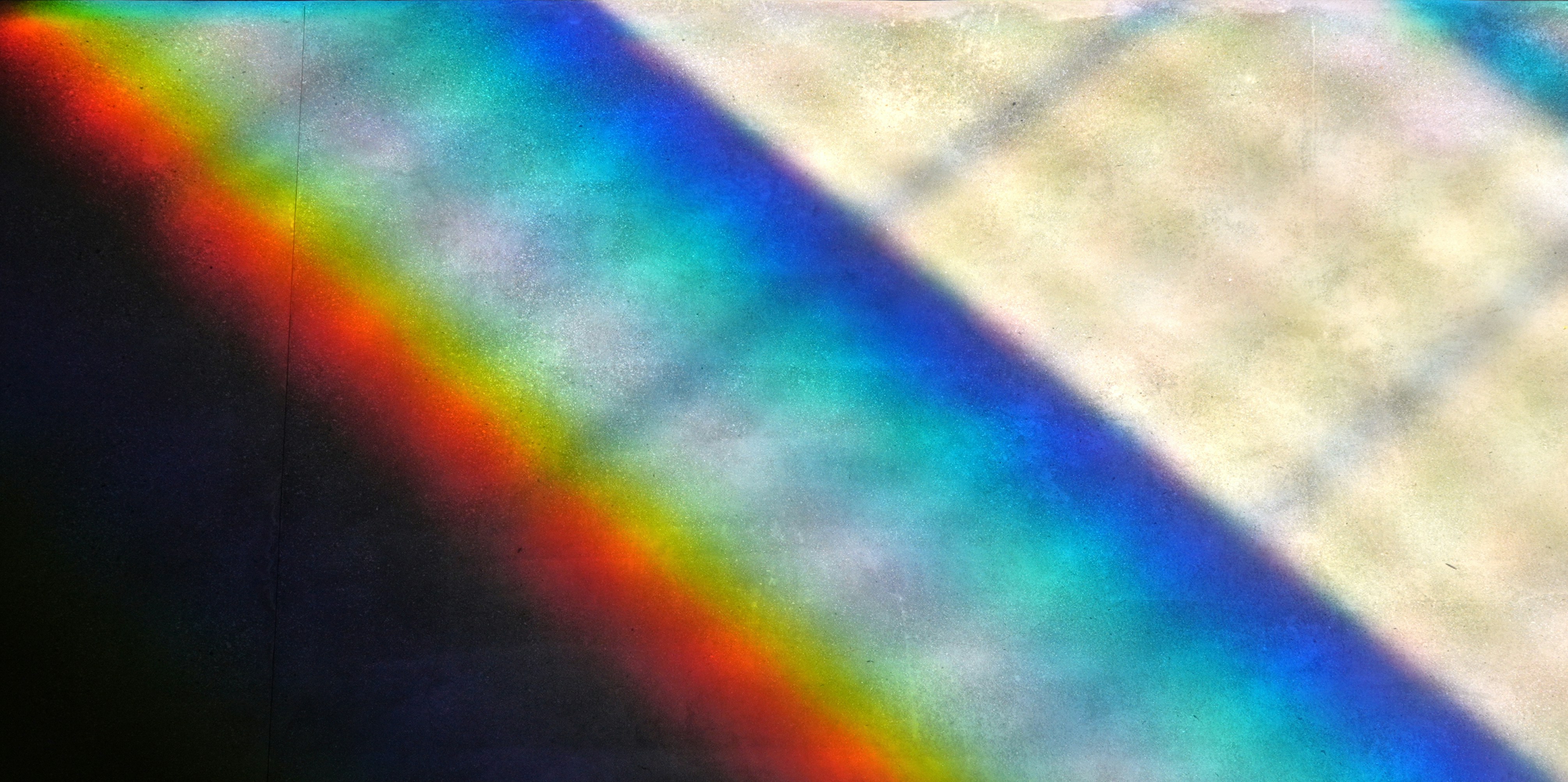  Prism Edge: A Sliver of Spectrum Across a Velvet Field