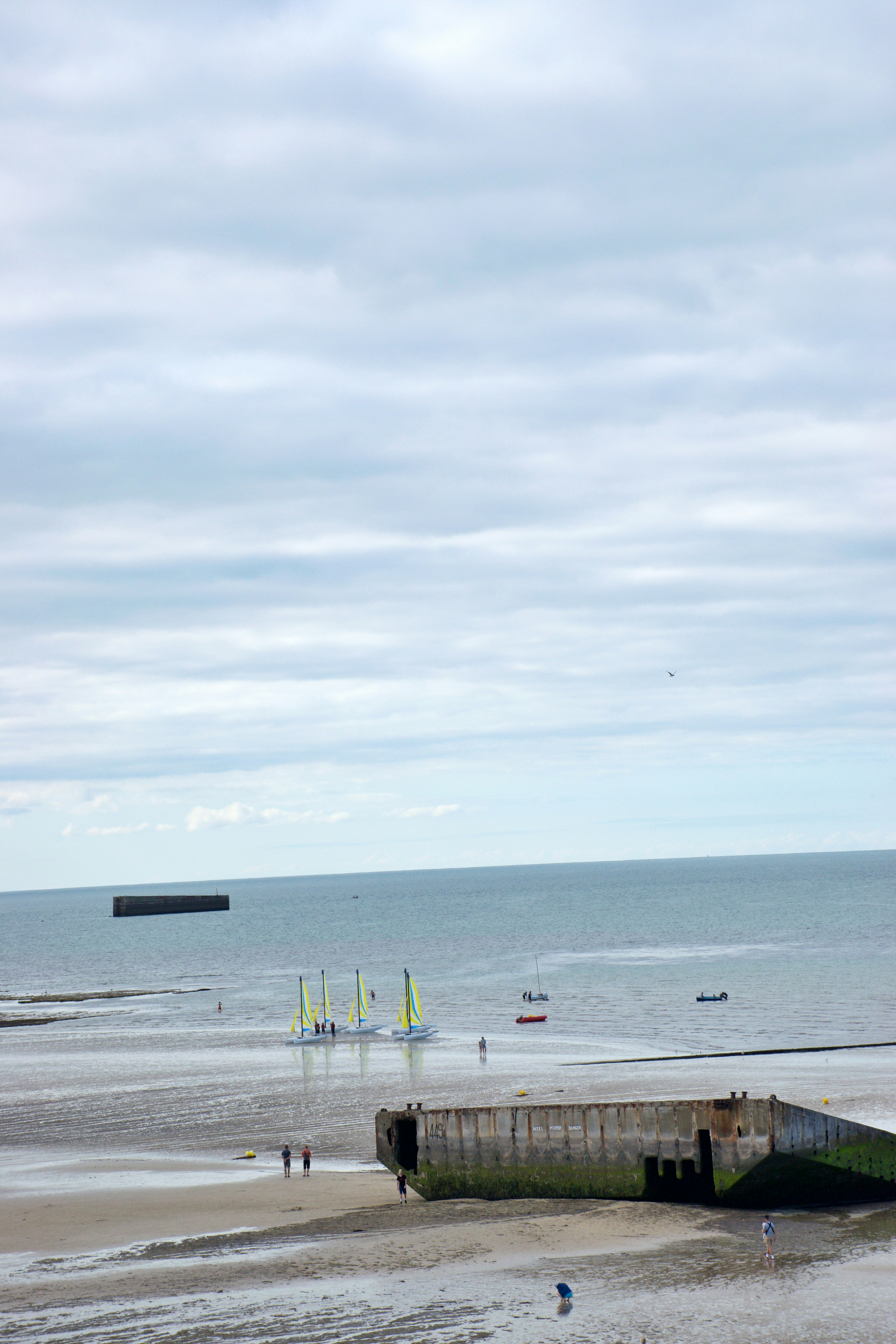 Low Tide at the Quiet Cove, Sailboats in the Distance