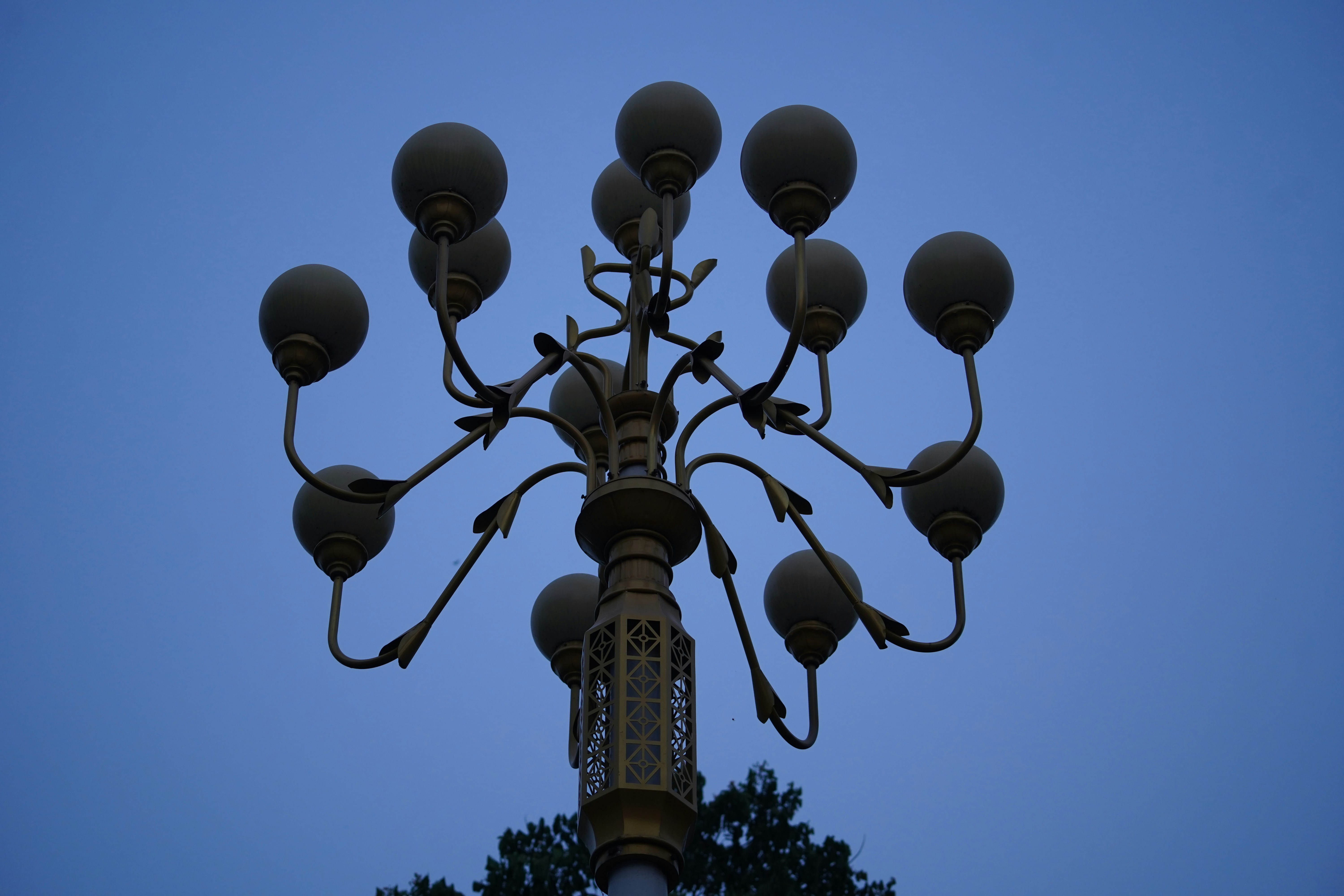 Ornate Lanterns Reaching Toward a Clear Sky