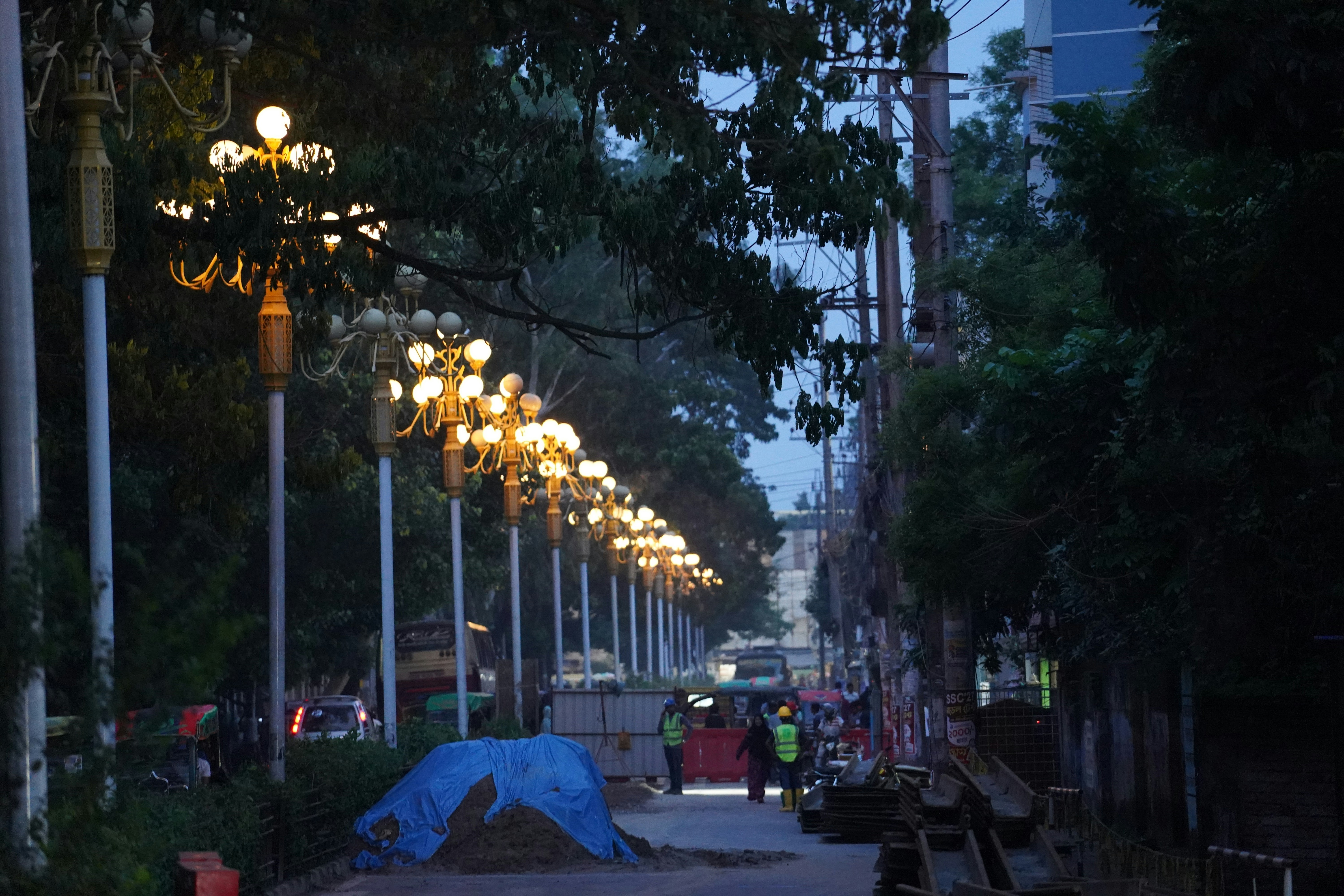 Evening Street lanterns: line of light along a quiet urban path