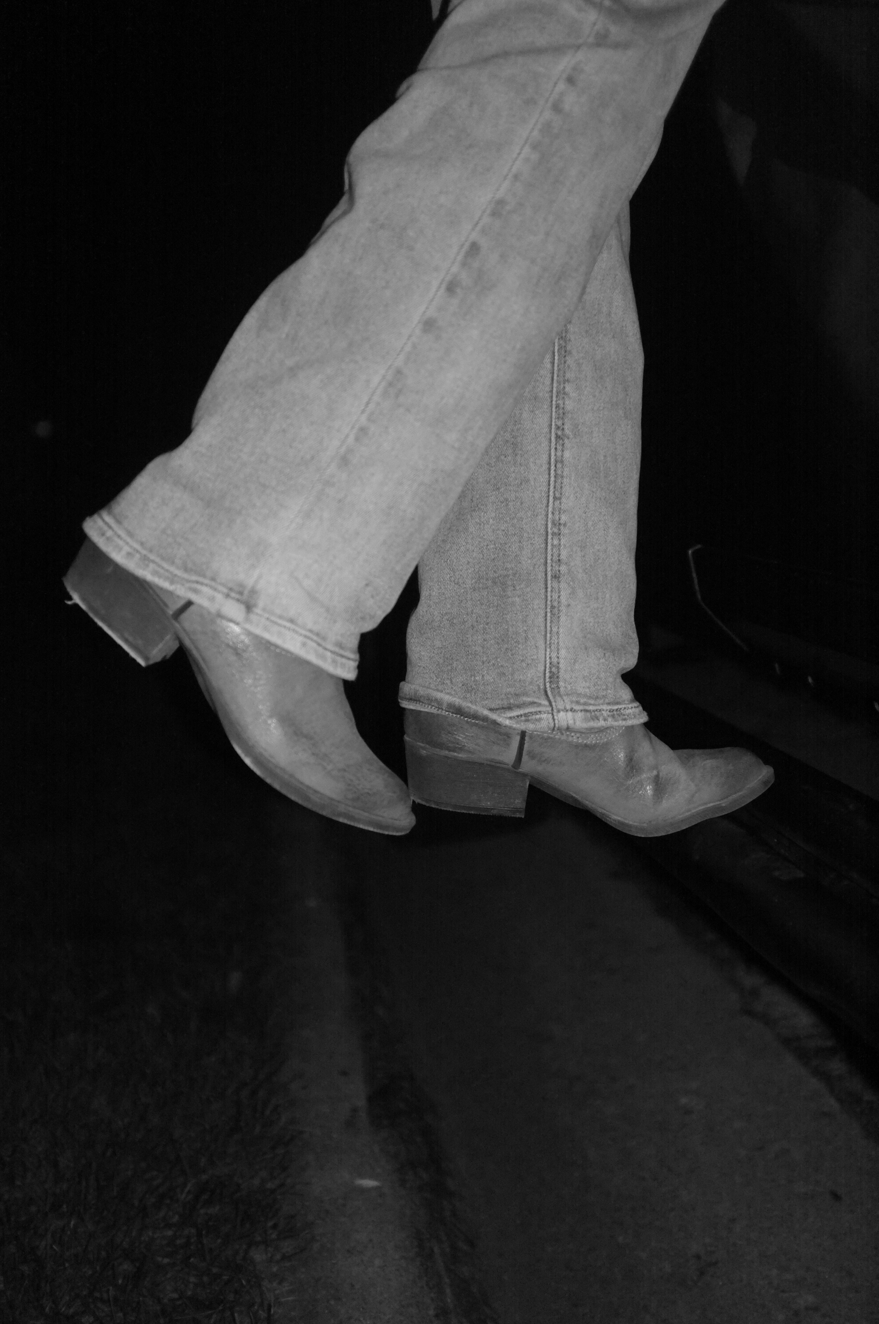 Walking in the Dark: A Pair of Boots on a Narrow Path