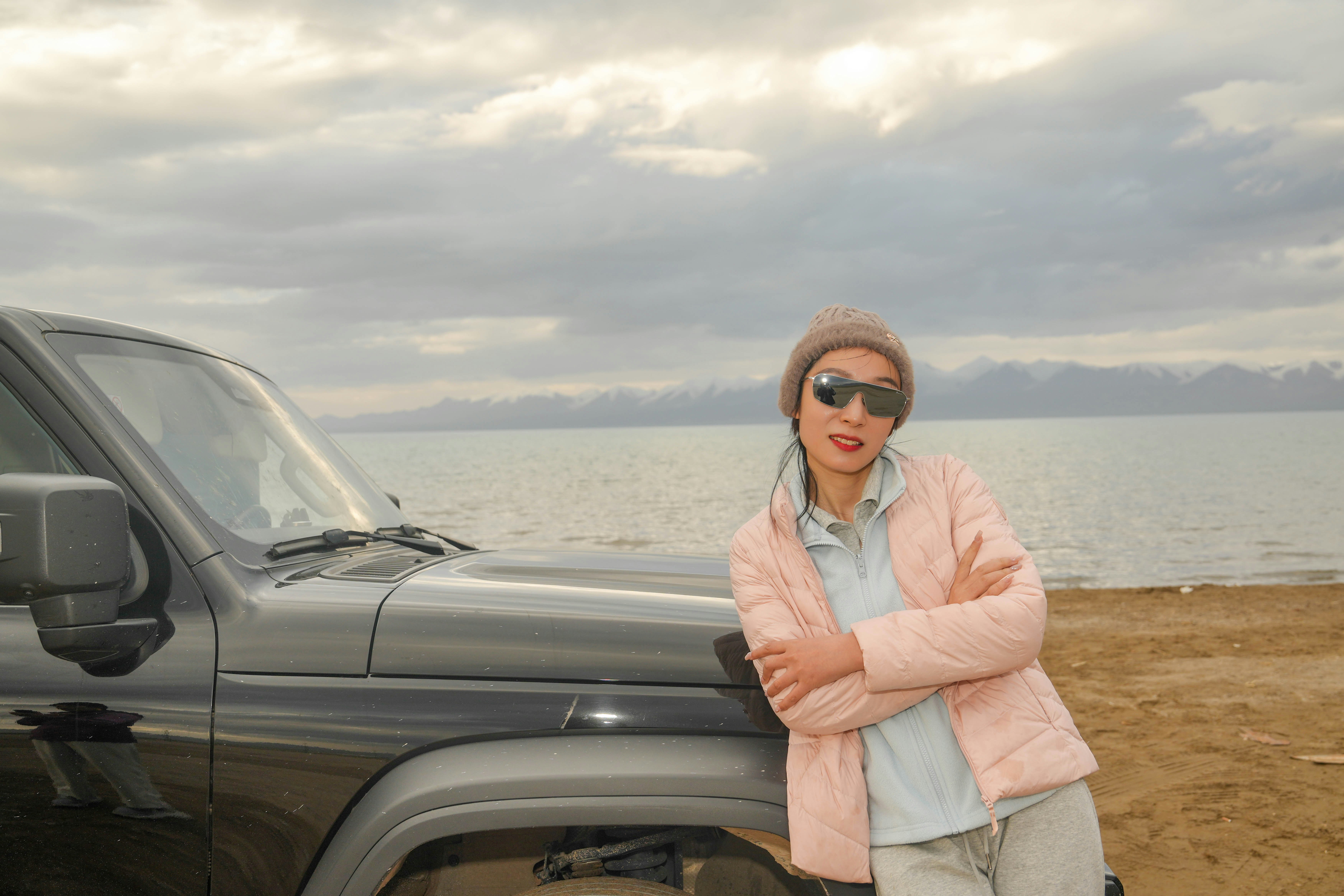 Coastal breeze and a rosy jacket by the roadside