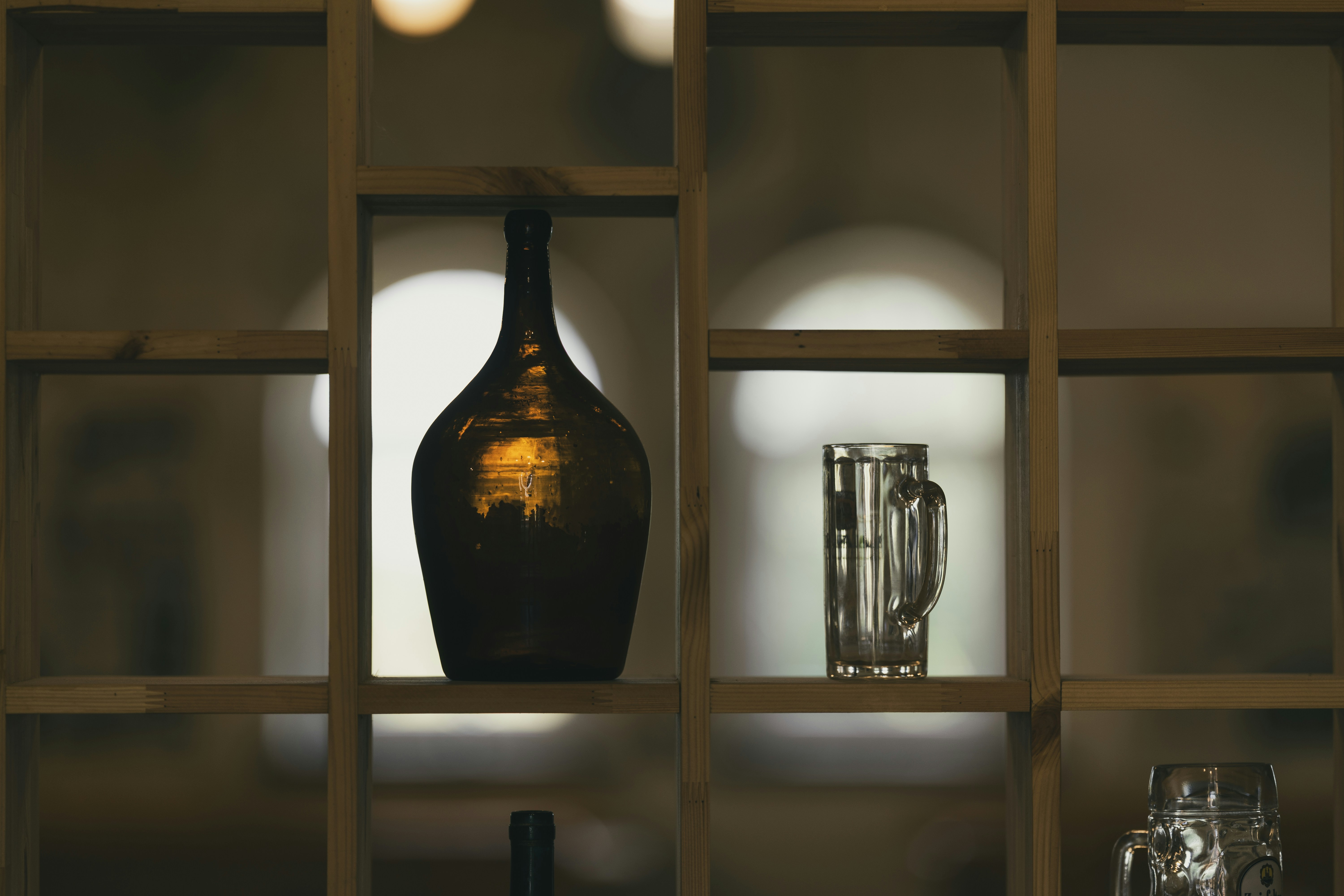 Symmetry on a Shelf: A Quiet Still Life of Glass and Light