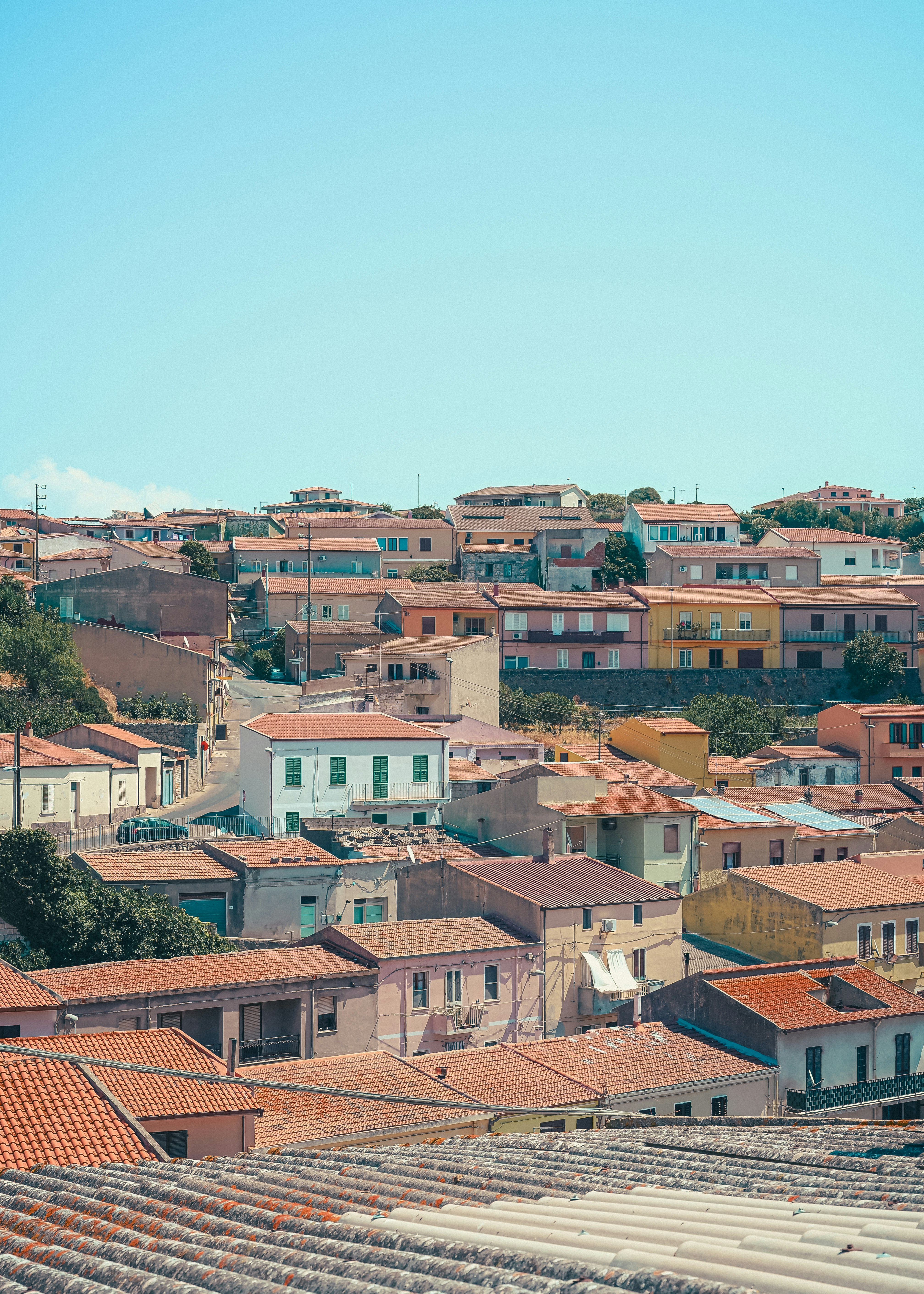 Terracotta Cityscape under a Wide Blue Sky