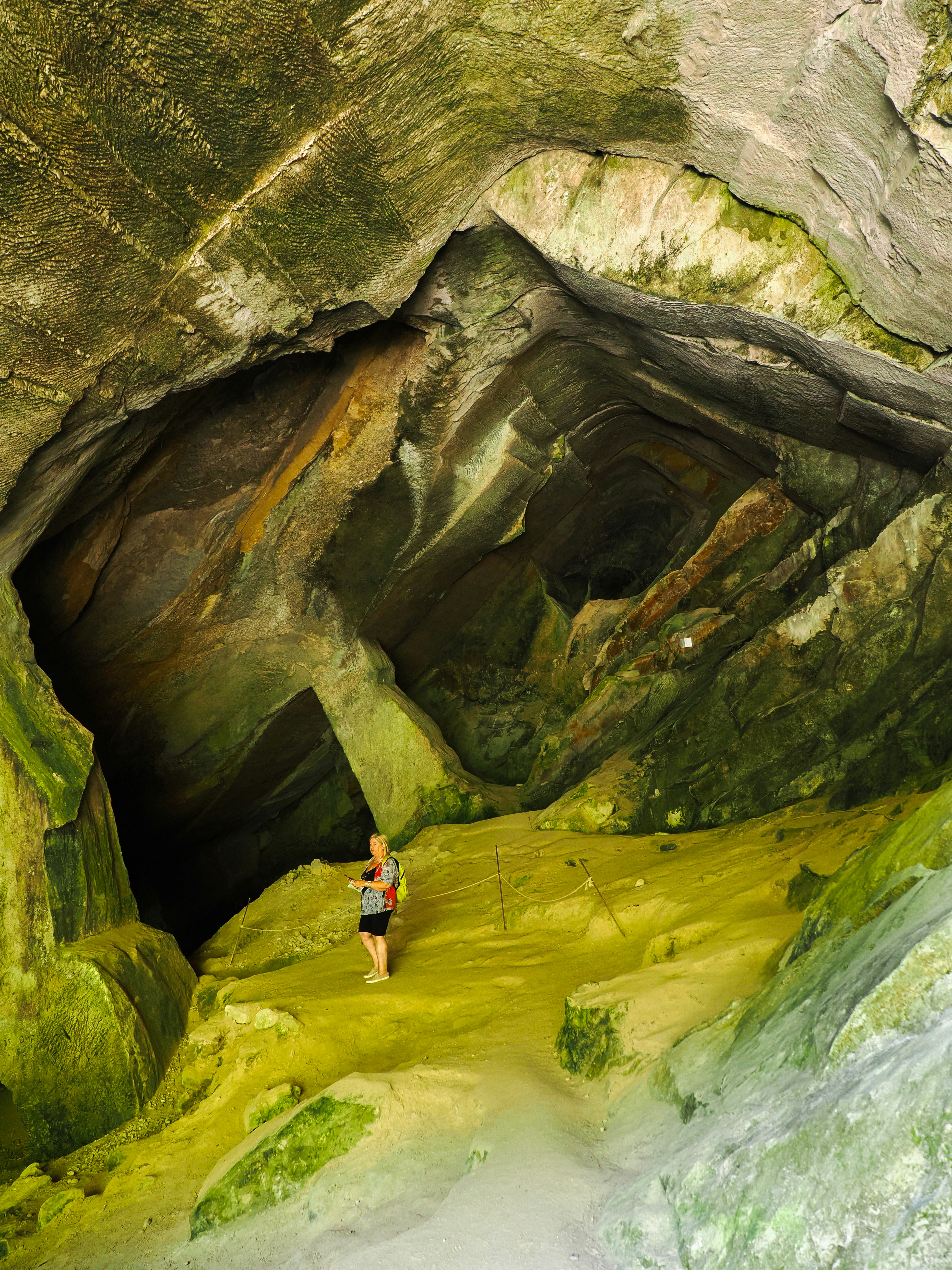 Deep Entry: A Lone Explorer Within the Canyonous Cave