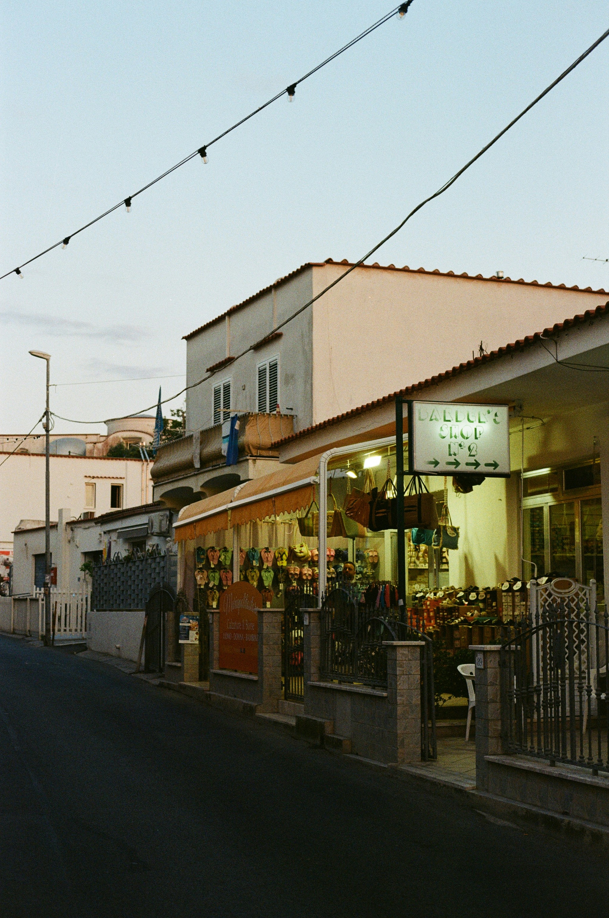 Shopfront in Warm Evening Light on a Quiet Street