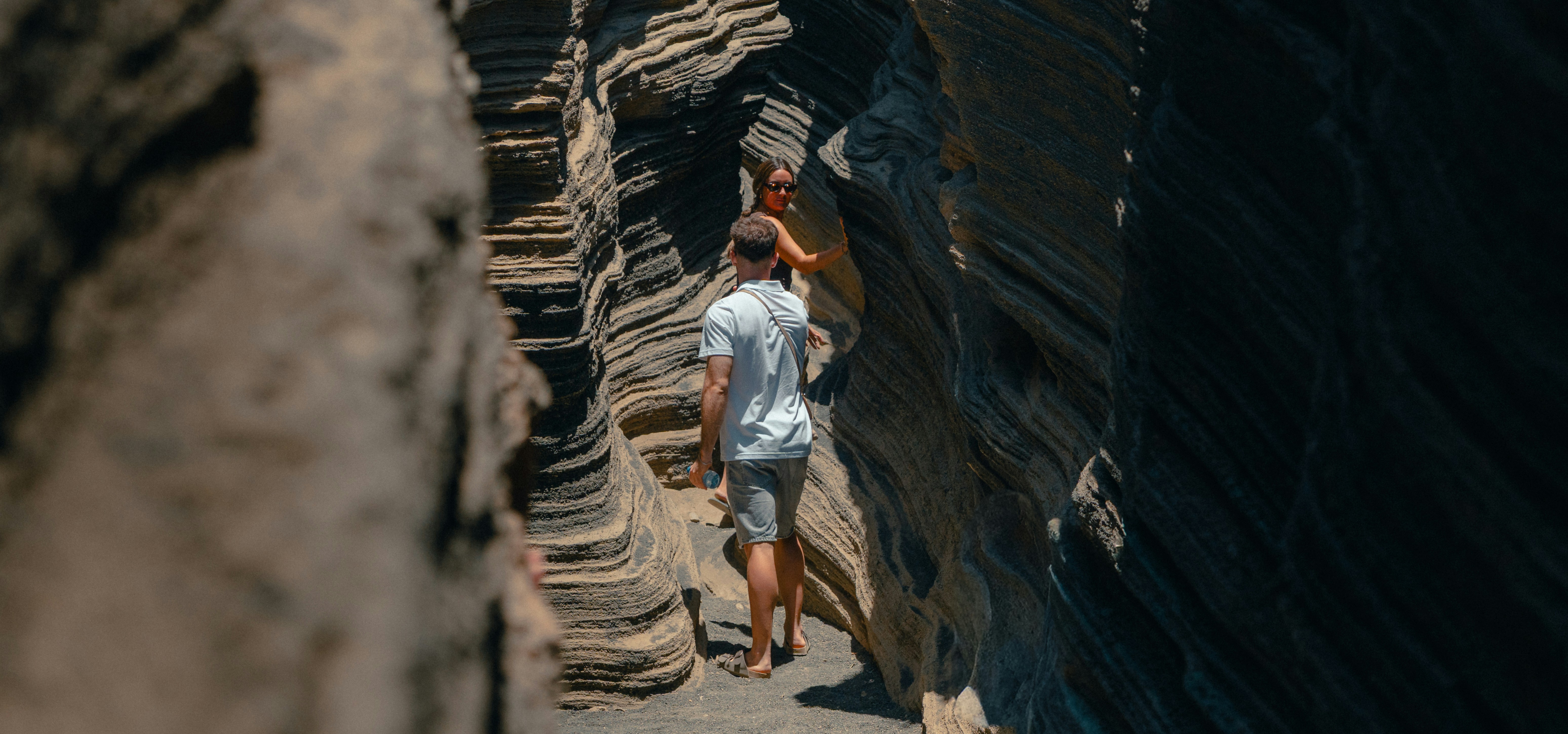 Trail Through Striated Labyrinth: A Quiet Ascent Between Rock Facades