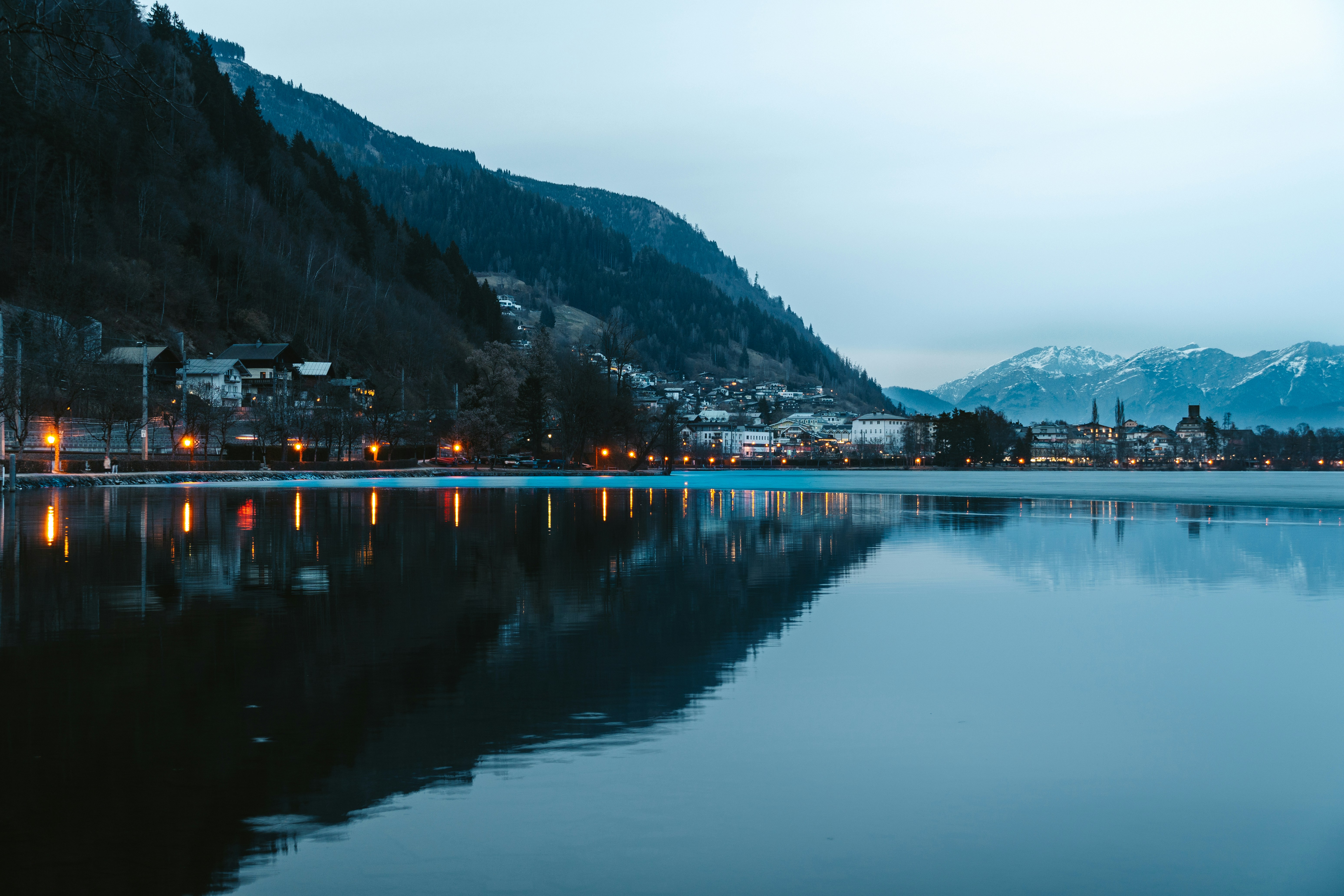 Mirrored Waters: A lakeside village at blue hour