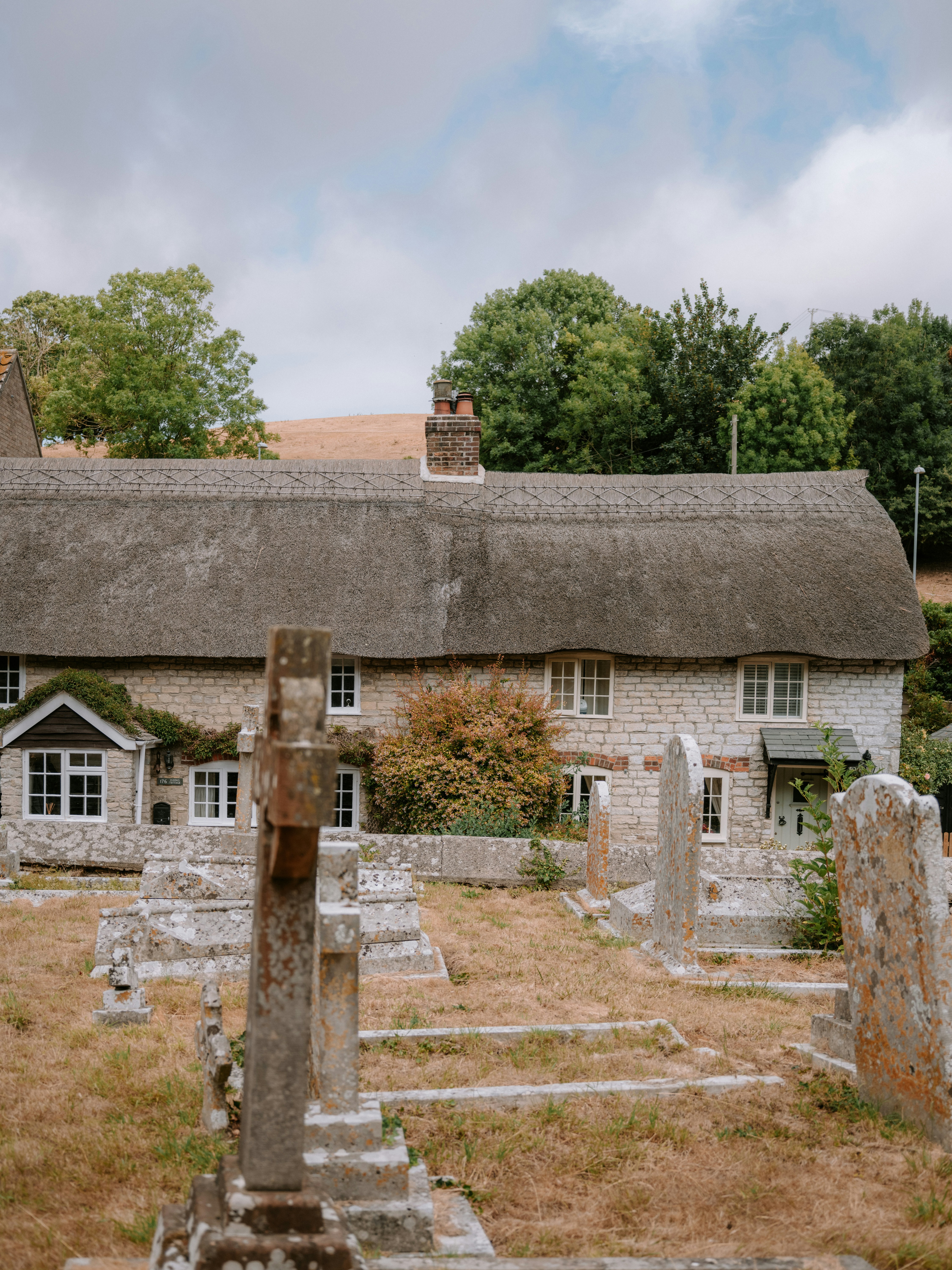 Thatched Cottage Graveyard: Quiet Rows of Weathered Stones