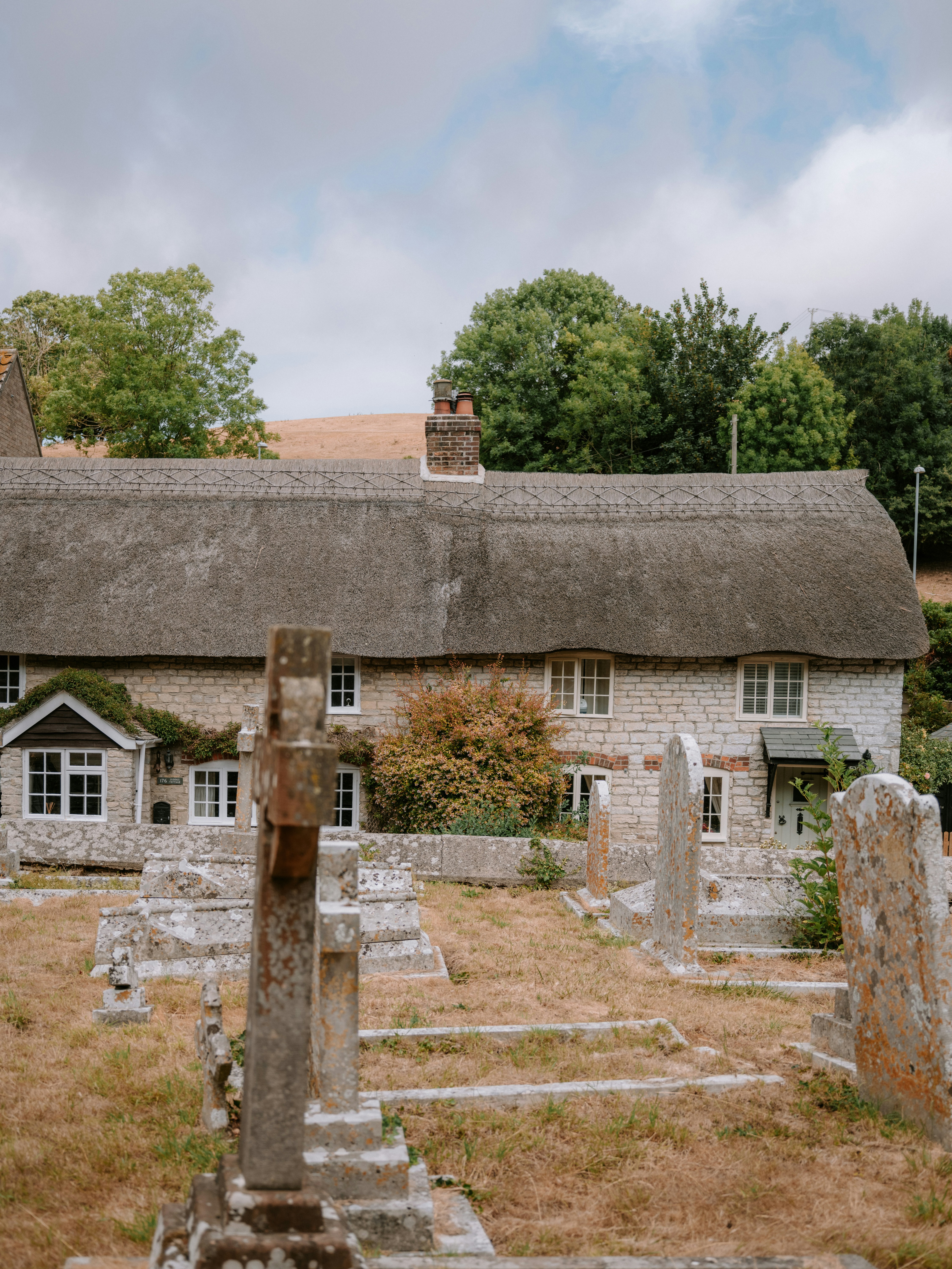 Thatched Cottage Cemetery: Quiet English Village Scene