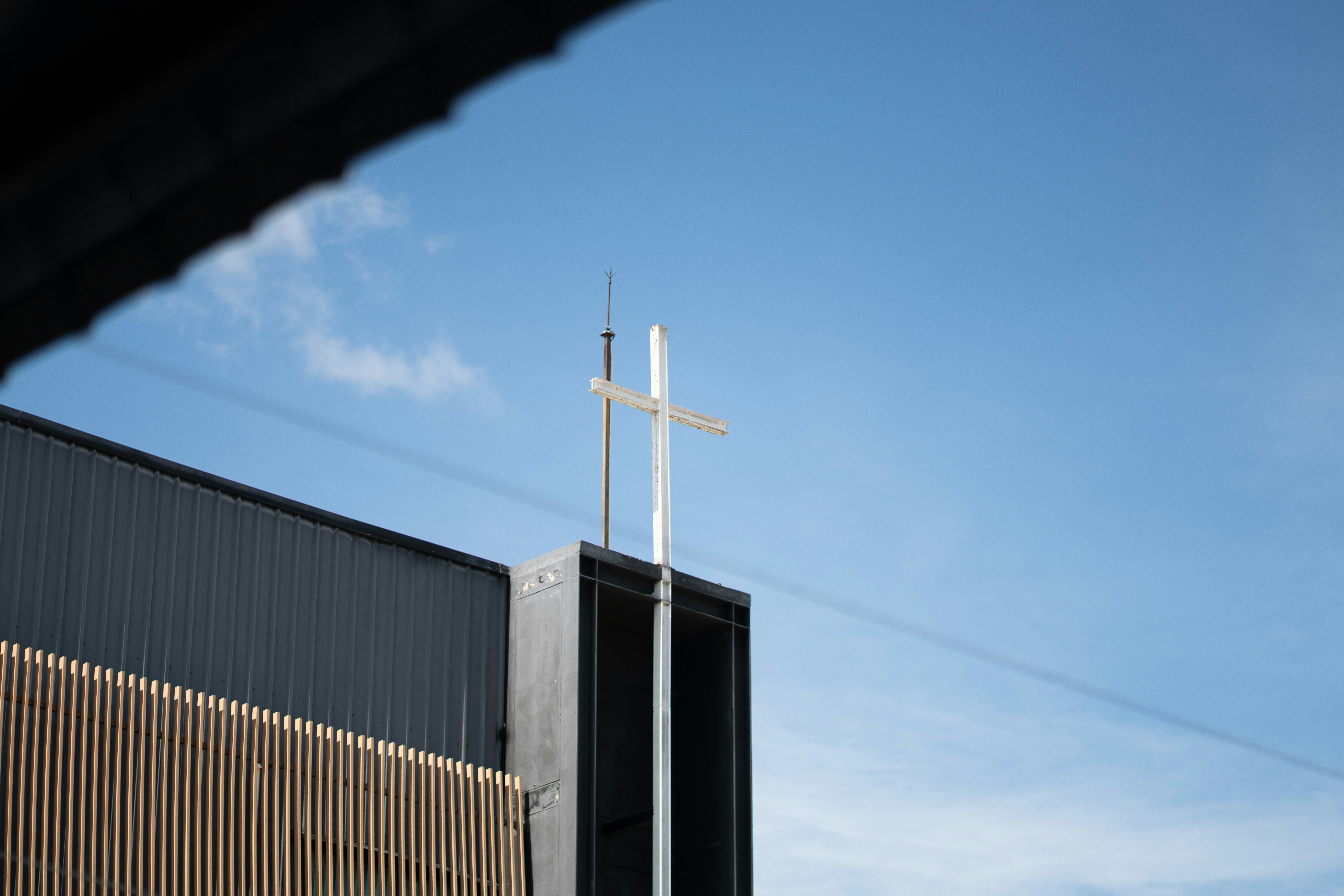 Crossed Anchor: A Minimal Church Spire Reaching Toward the Sky