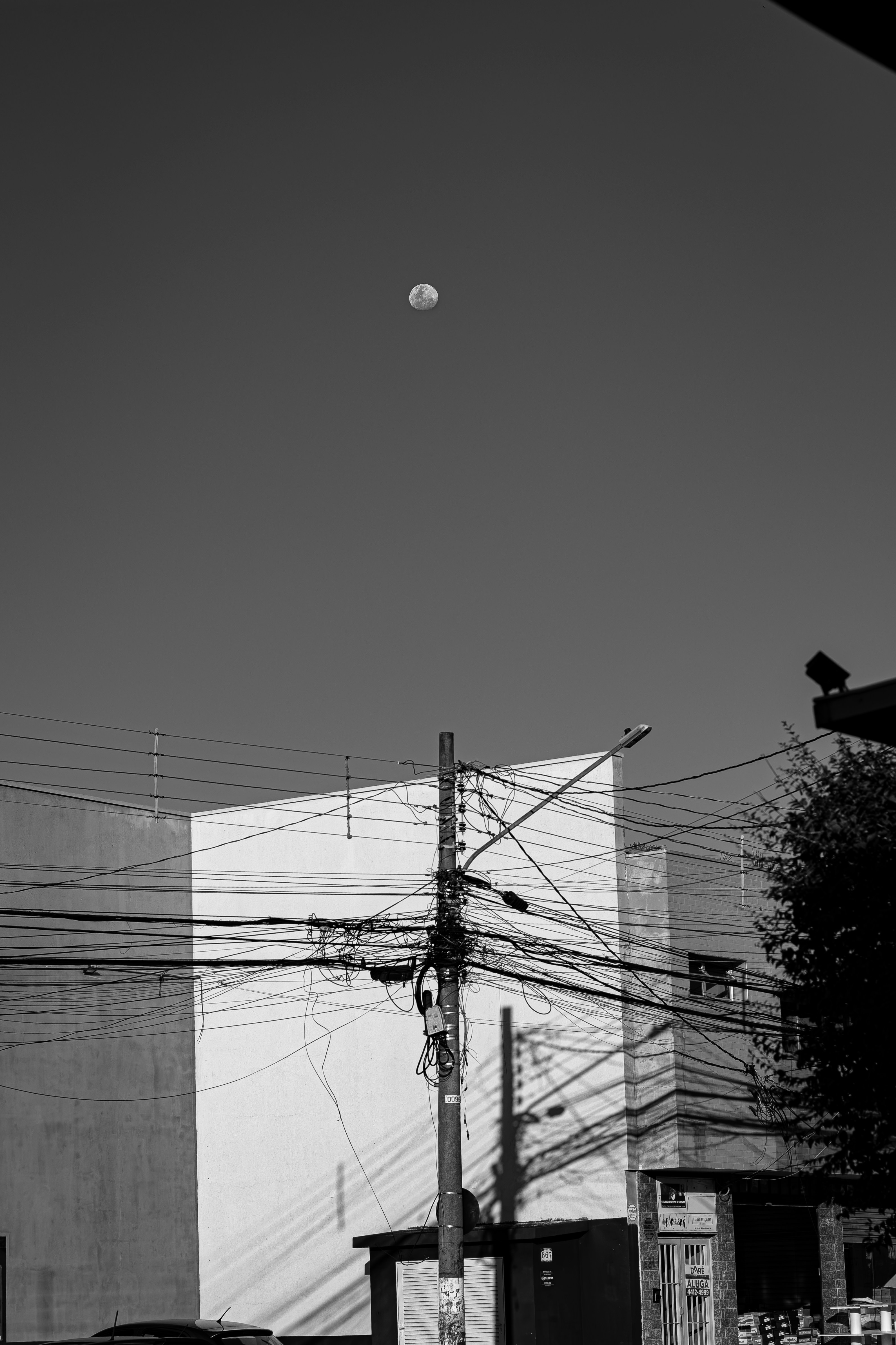 Moon Above the Grid: Quiet Urban Geometry