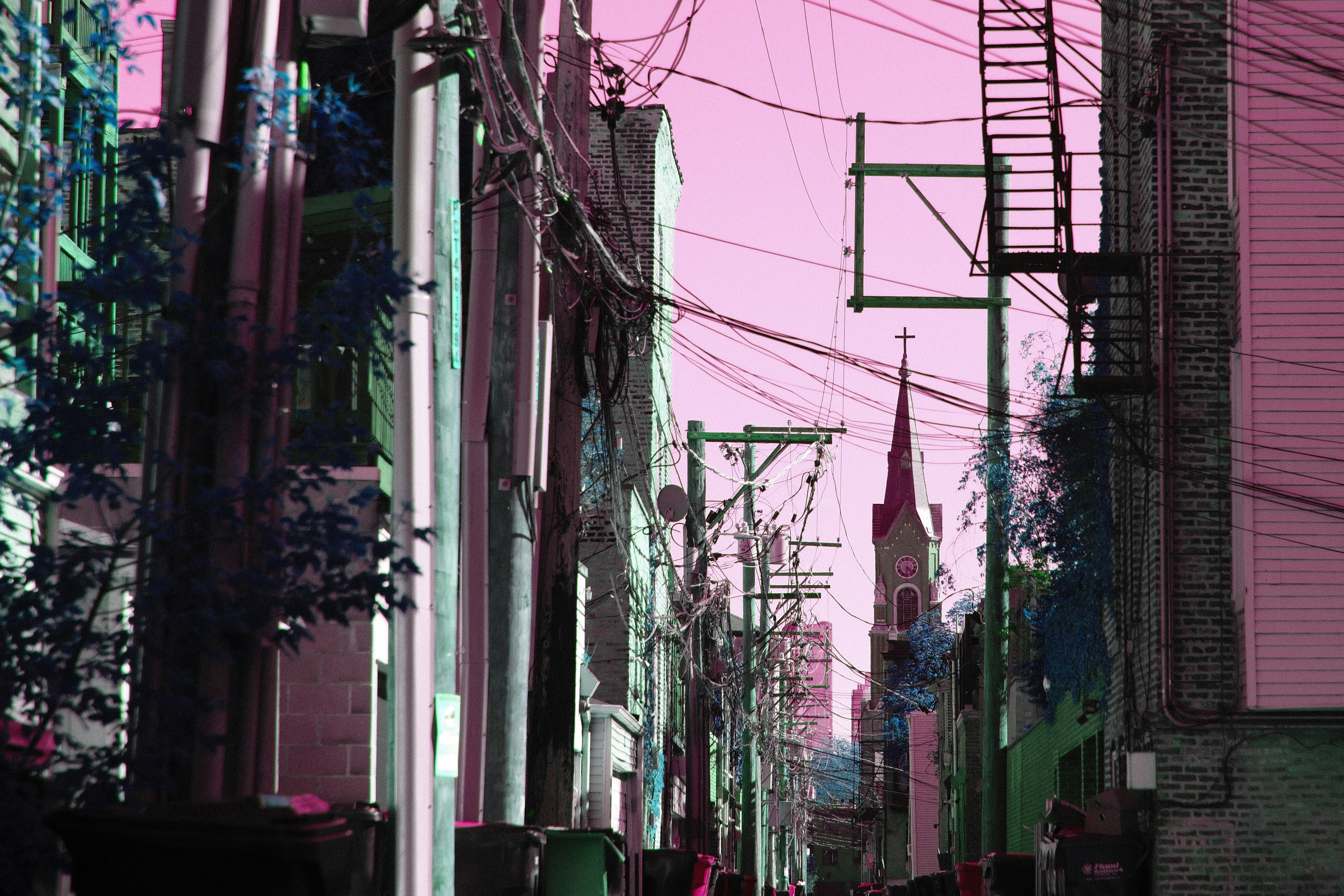 Alleyway to a Clock Tower: Urban Ladder of Wires and Light
