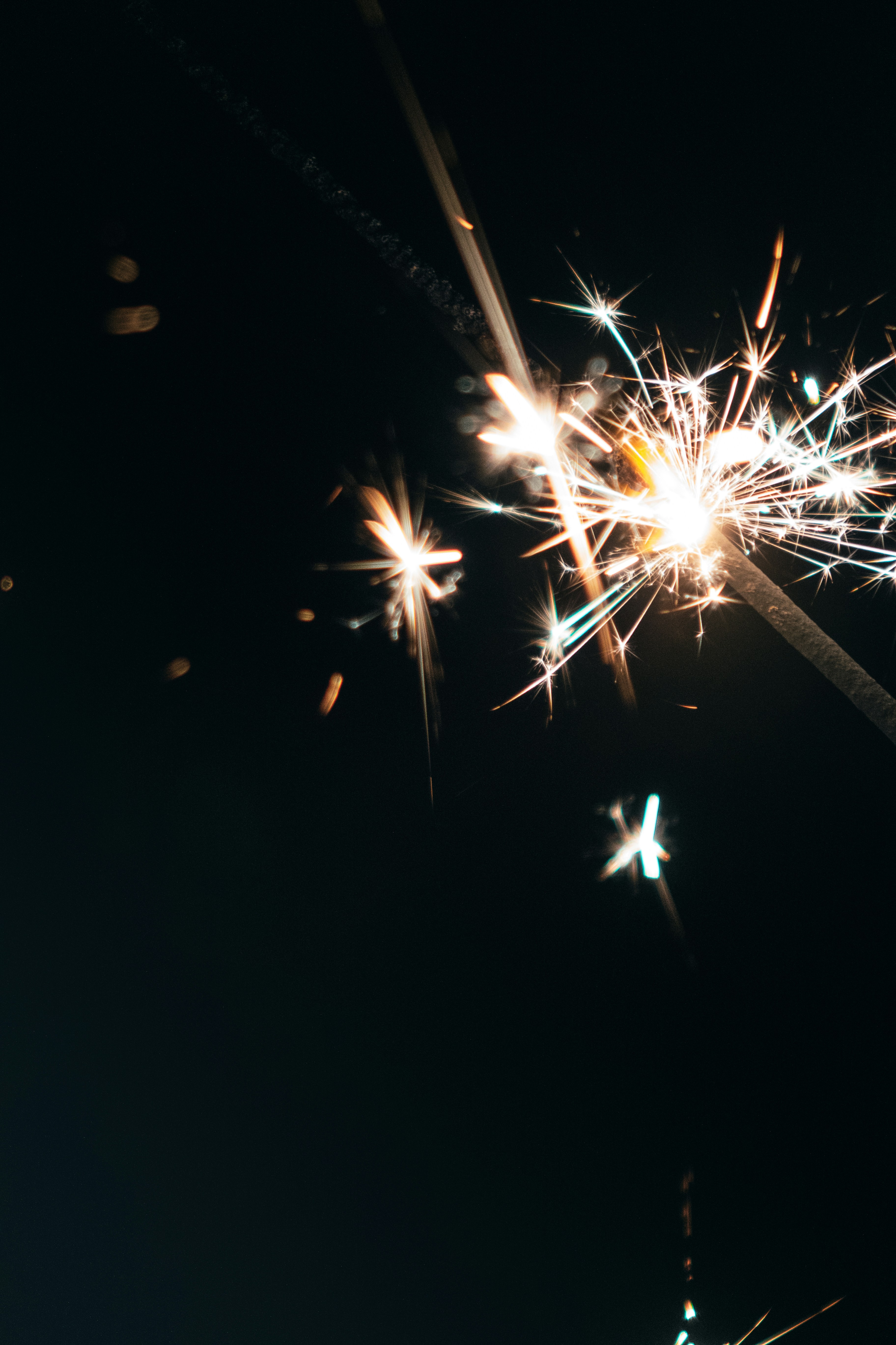 Spark of Night: A Close-Up of Welcoming Sparks