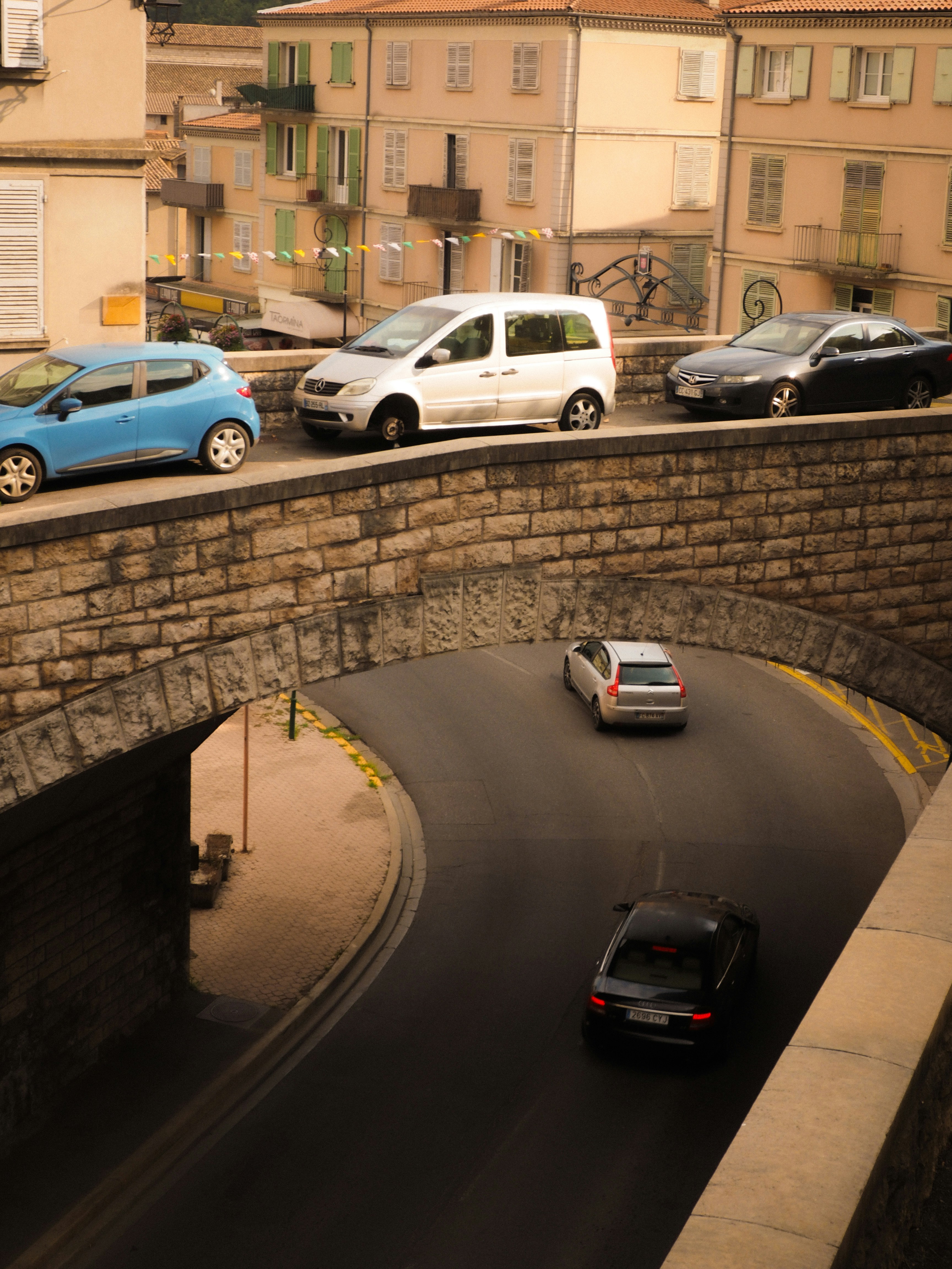 Bridge Over Quiet Traffic: An Alpine Arc of Street Life