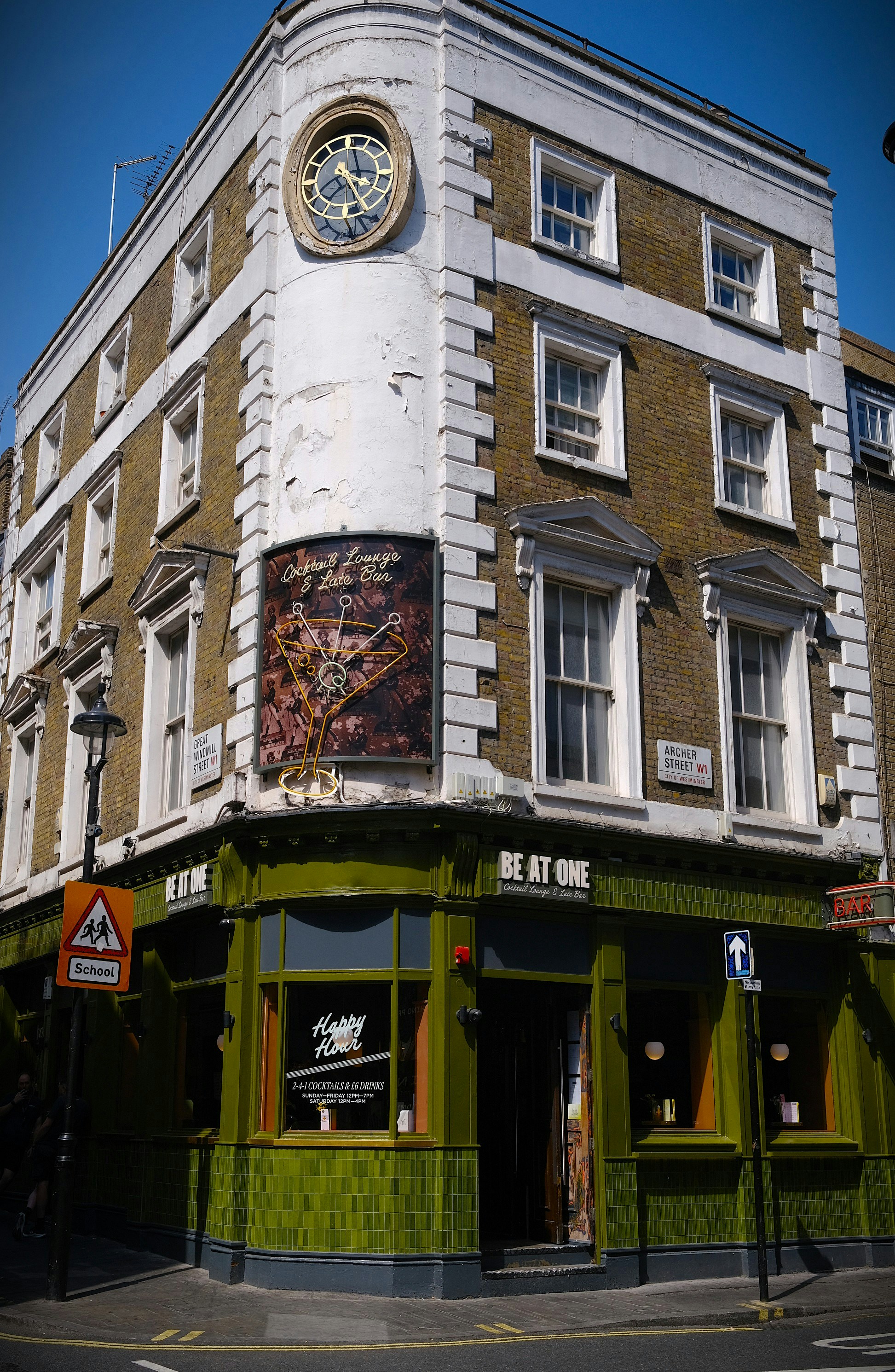 Corner Clock and Green Facade: A Cornerstore Tale