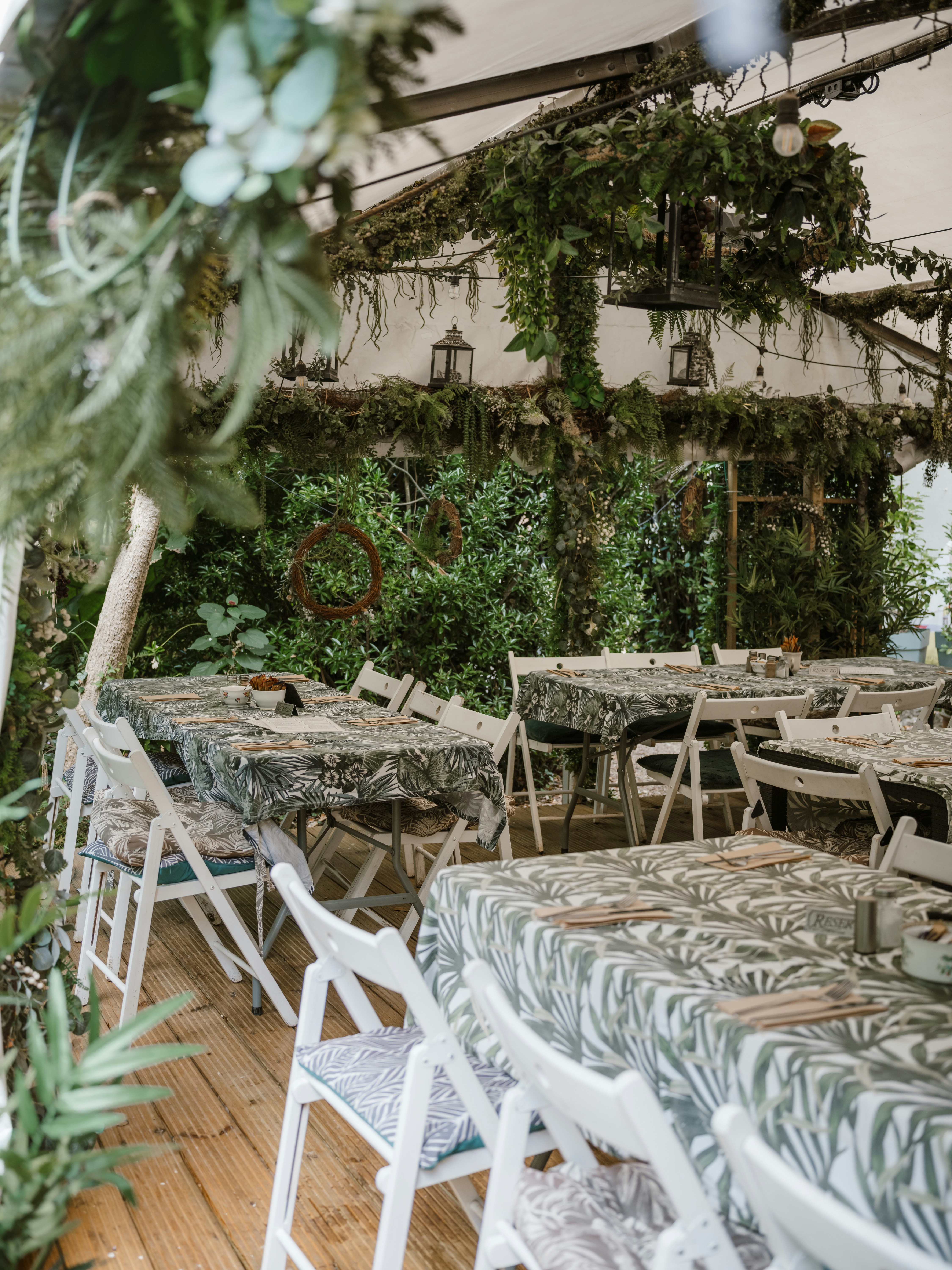 Verdant Wedding Table Runway under a Canopy of Greenery