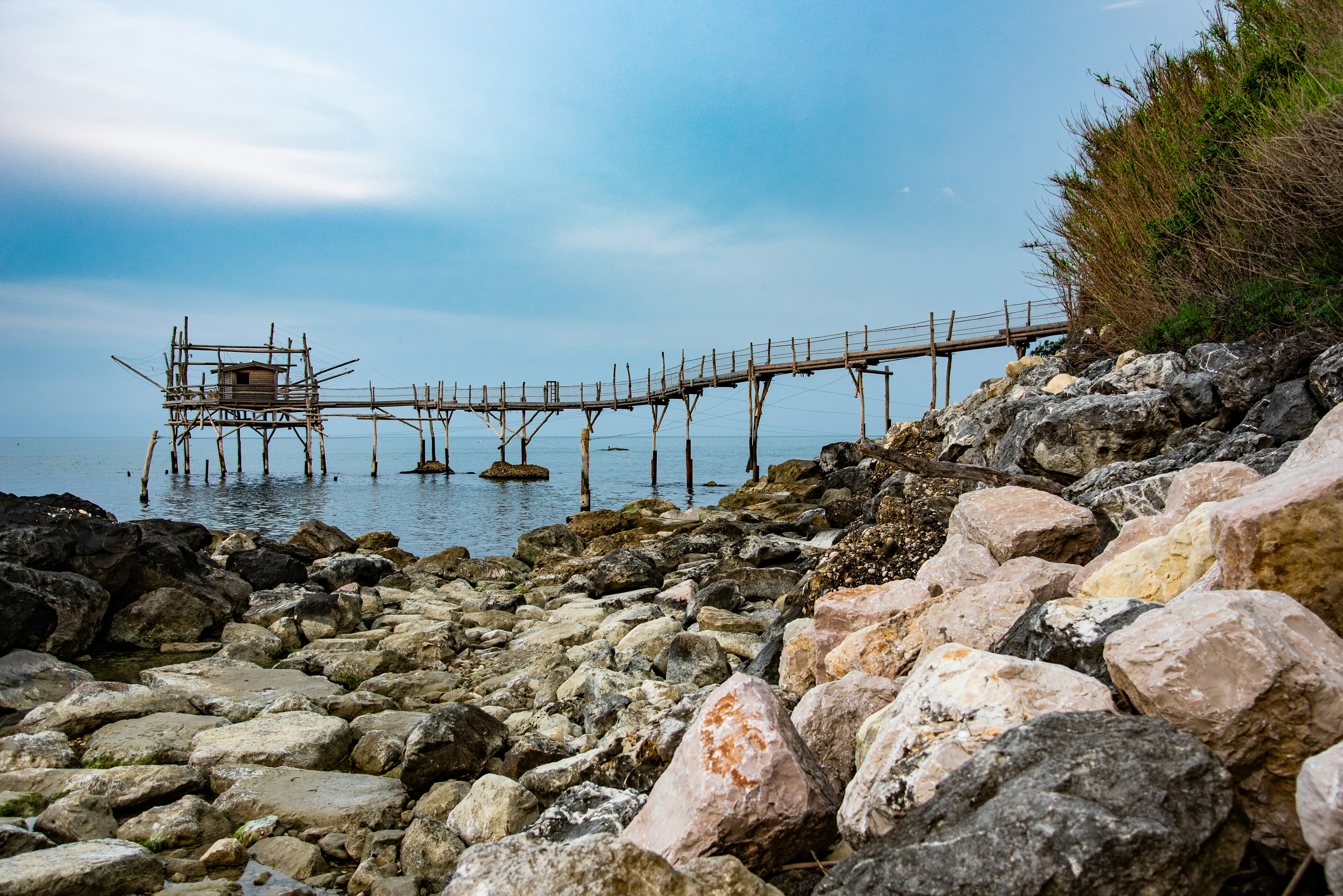 Rusted Pier Reaching Toward a Quiet Horizon