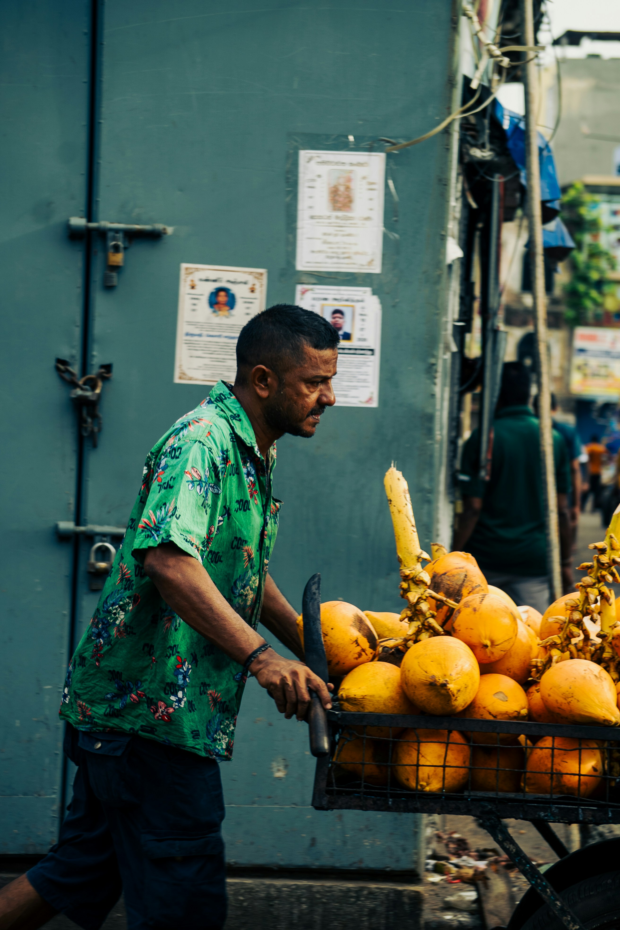 Coconut Vendor in a Busy Alleyway