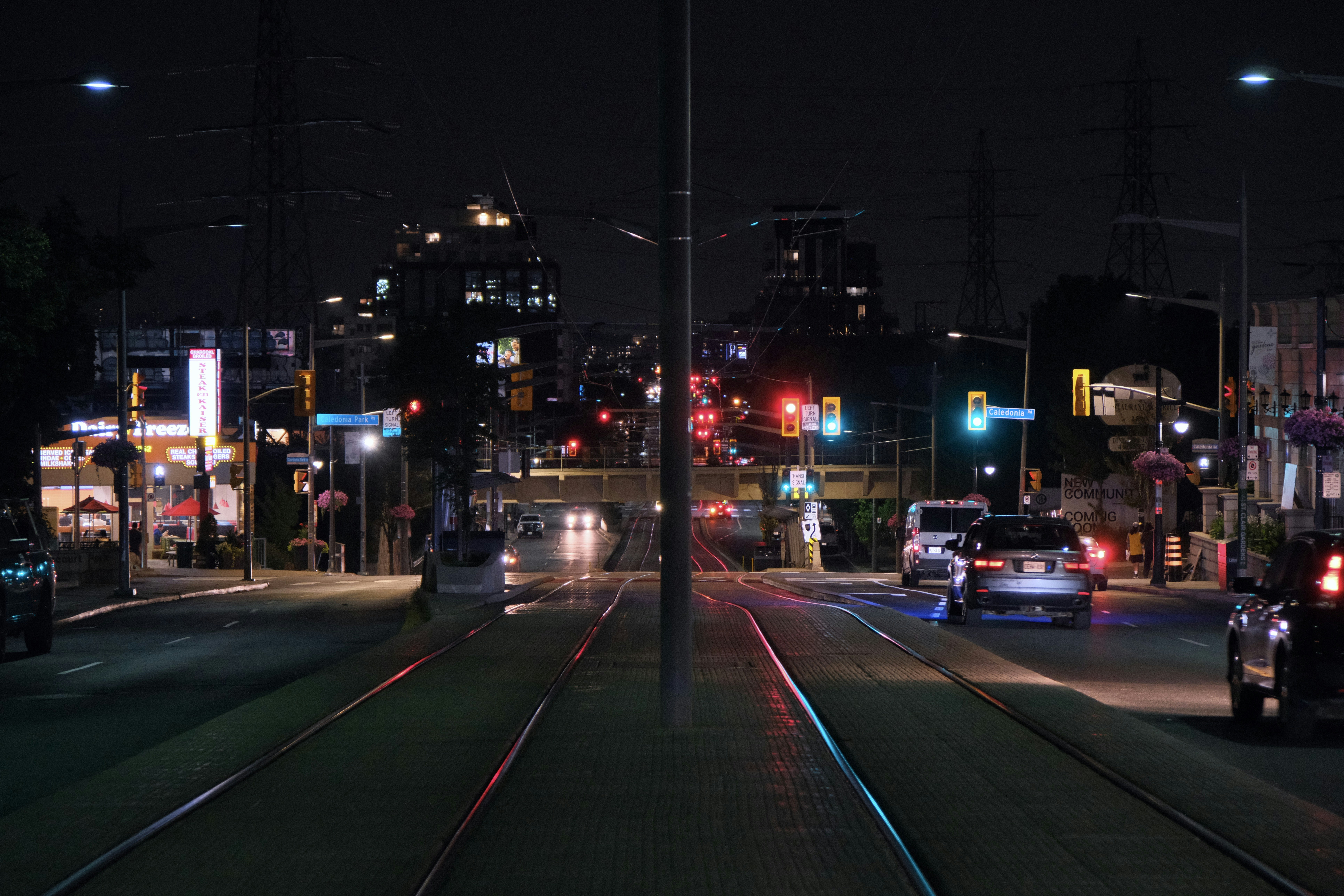 Night Streetcar Traces: Neon Rails Through the Quiet City