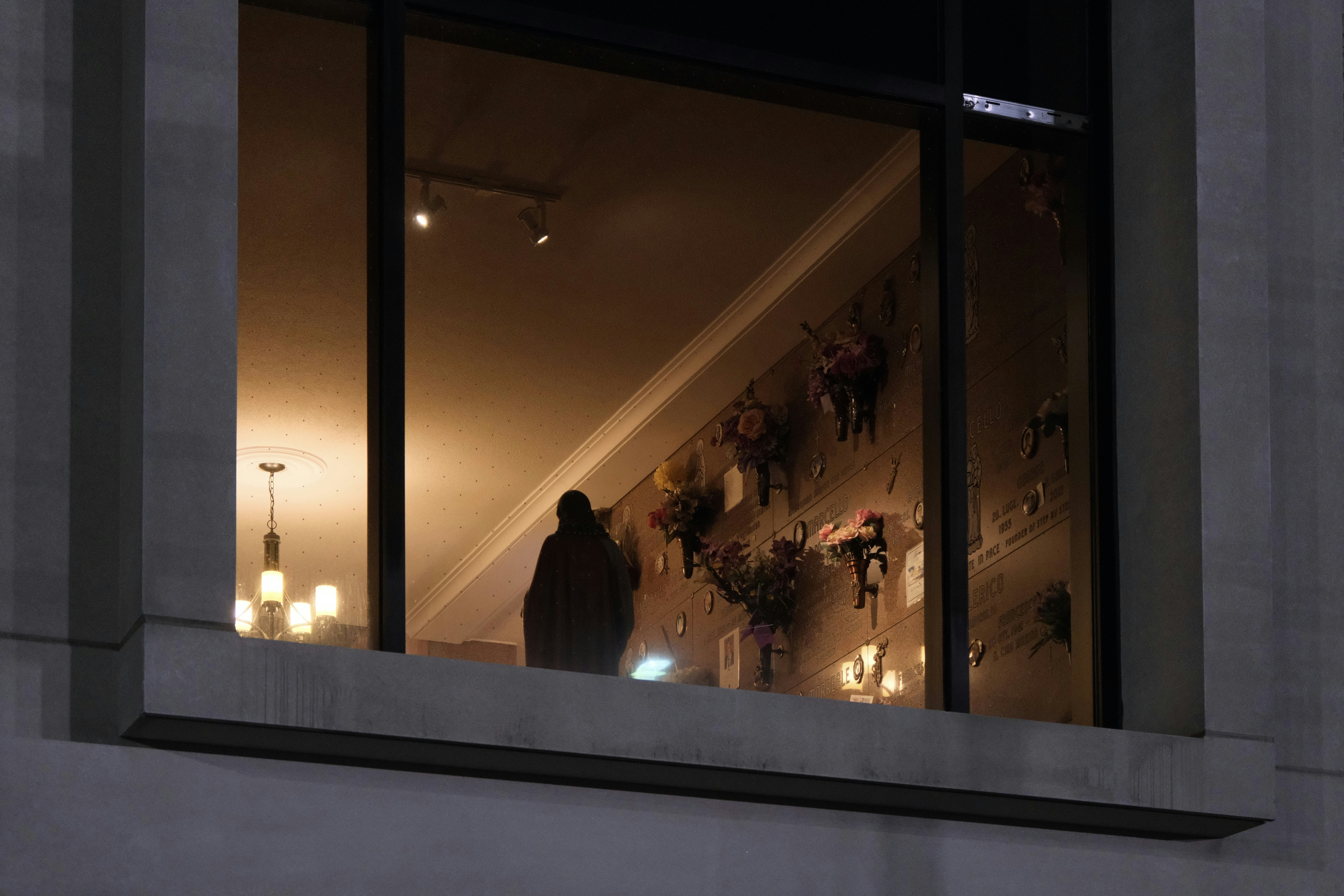 Silhouette in the Warm Hall: A Windowed Moment