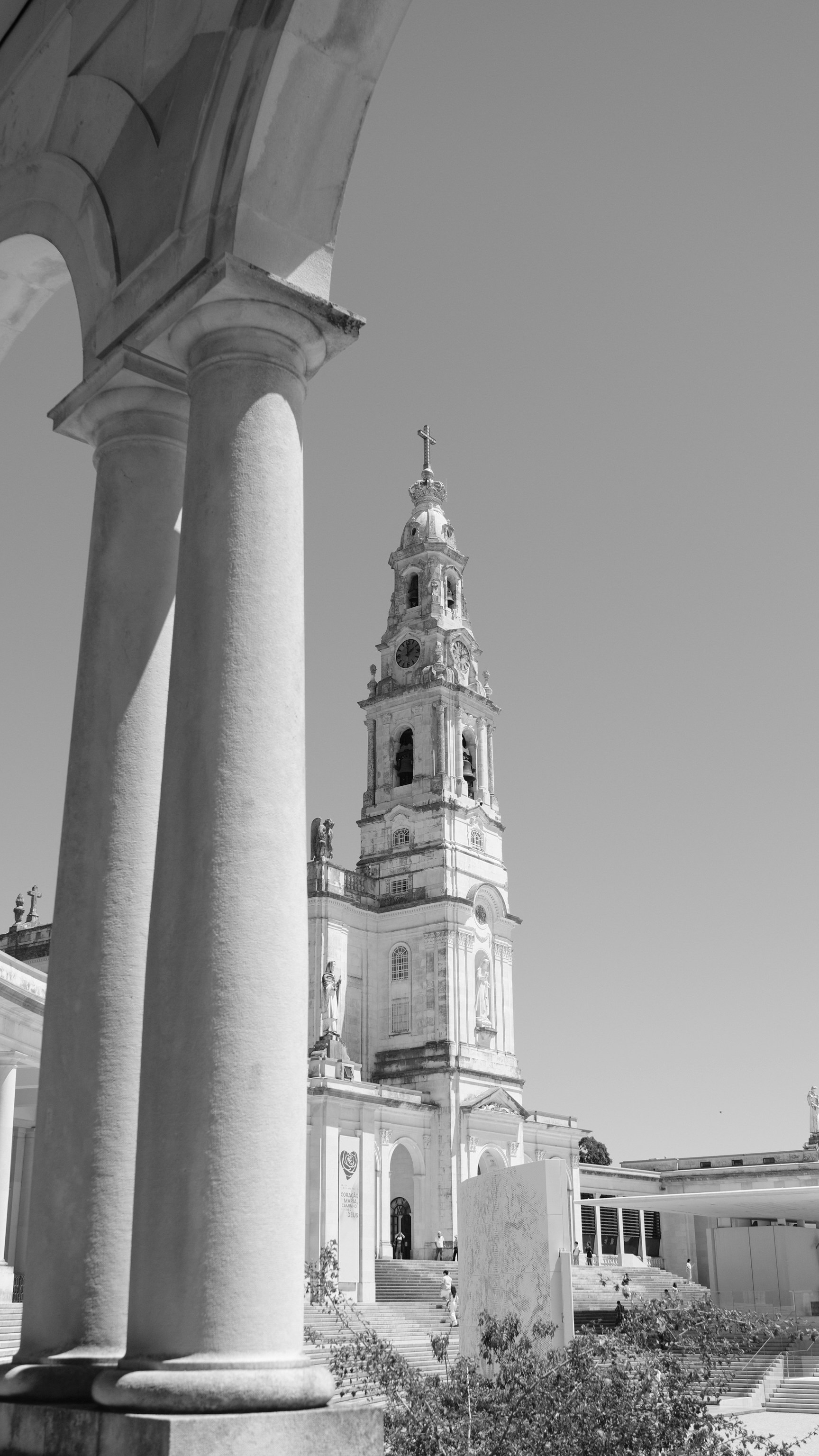 Towering Clarity: A Monolithic Church Framed by Classical Columns