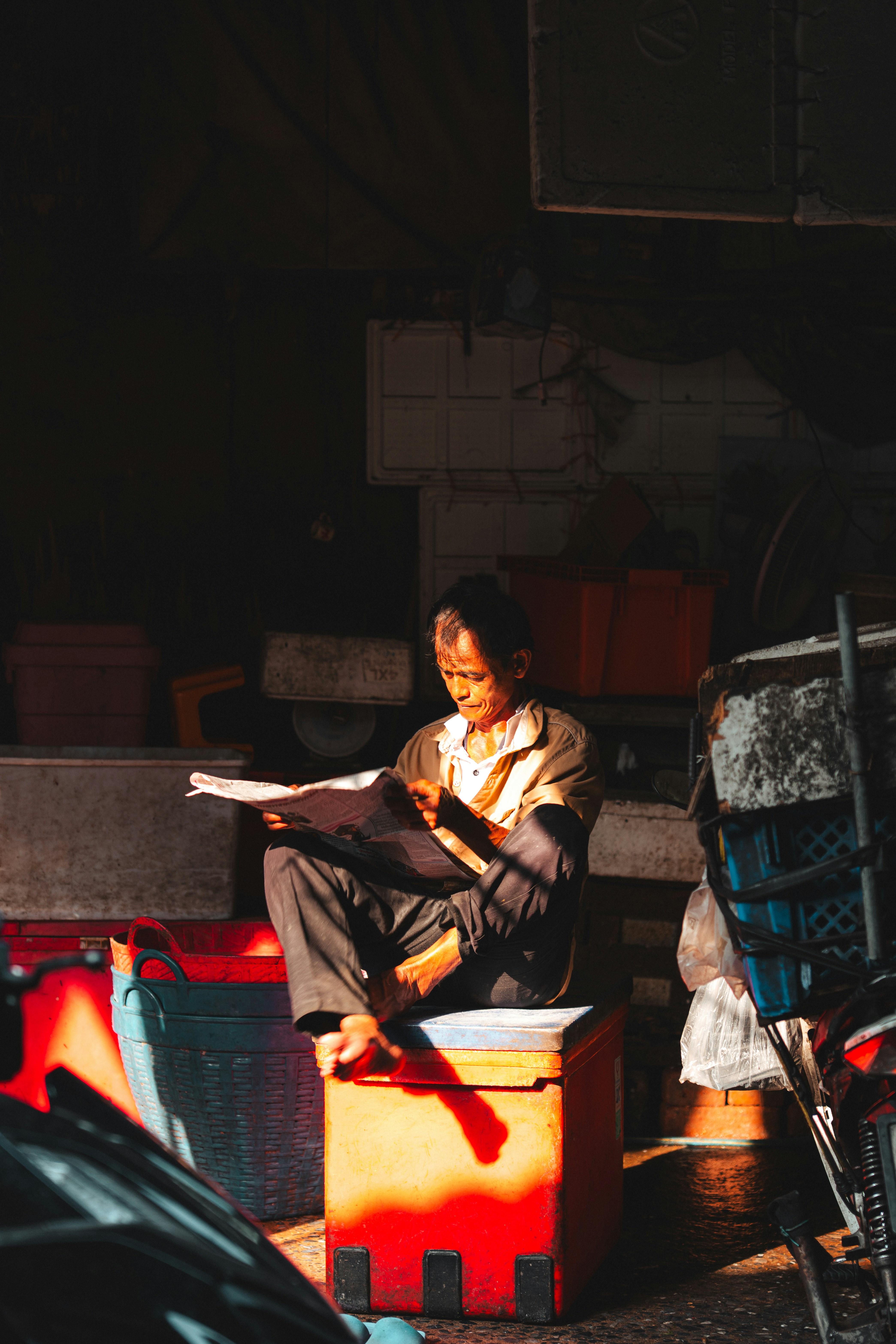 Reader in the Quiet Workshop: A Solitary Moment Amid Industrial Quiet