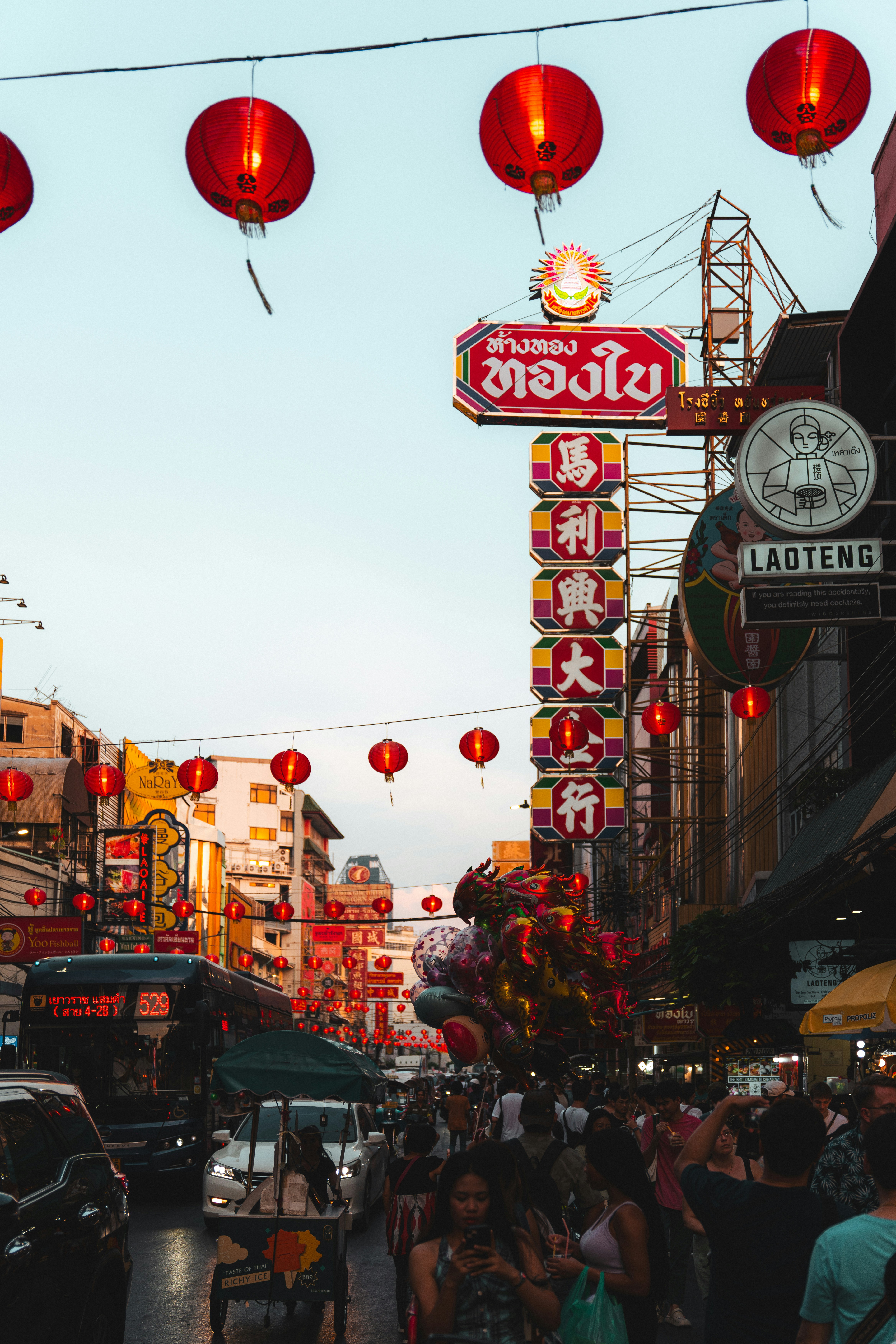 Lantern Light Over Chinatown: Neon Signs Amid Crowds