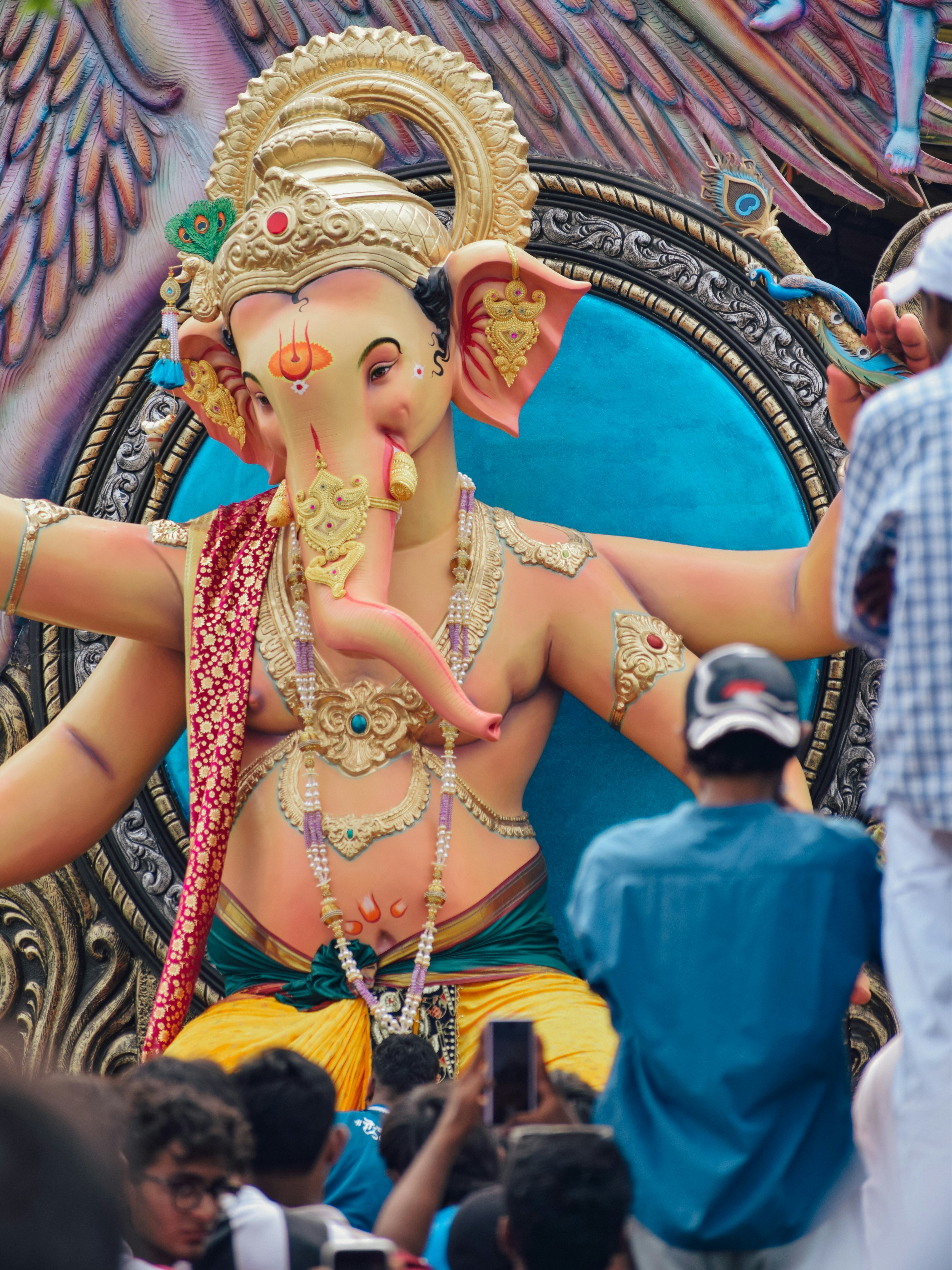 Giant Ganesh Statue Emerges from the Crowd at a Festival
