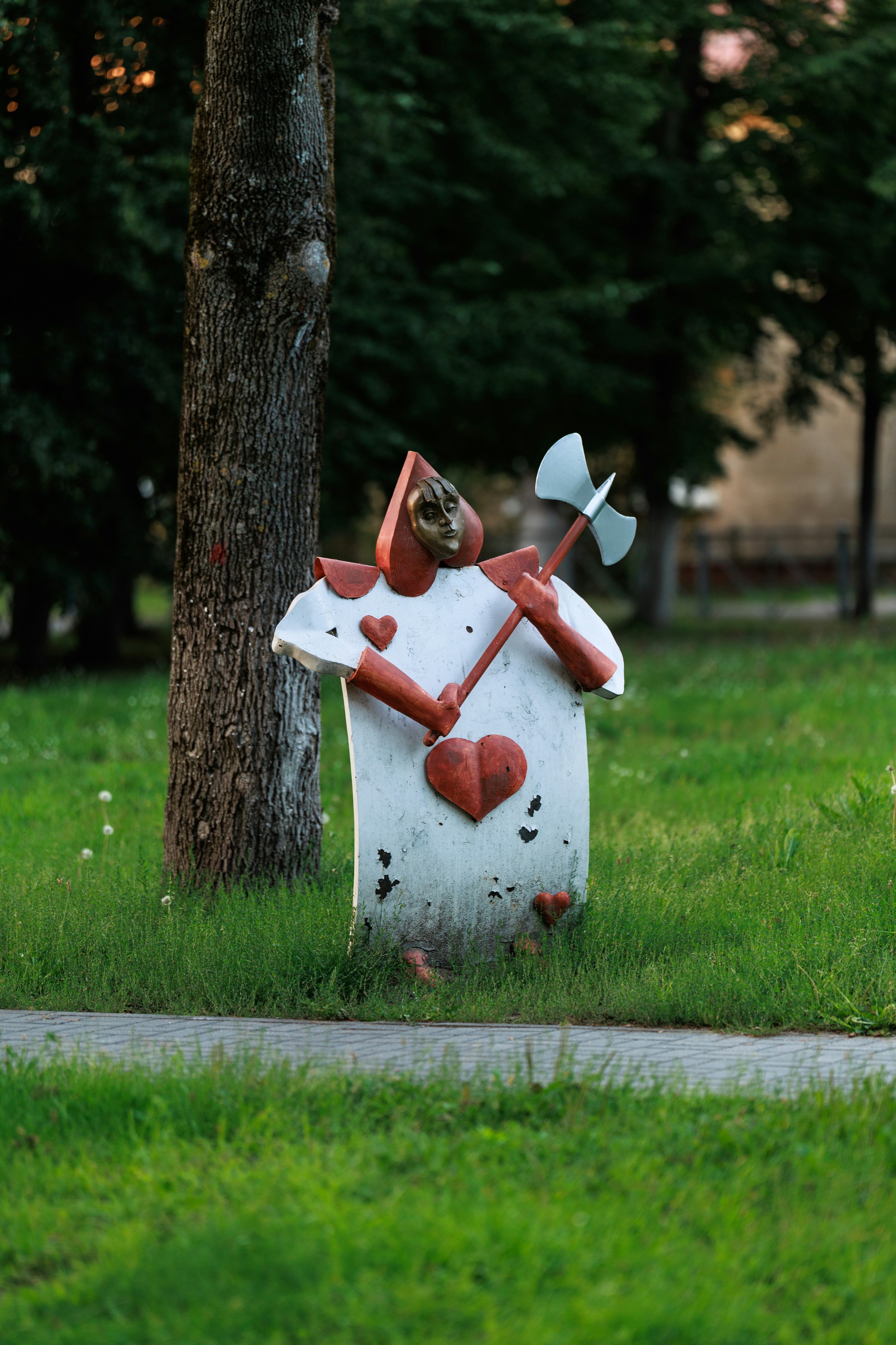 Love’s Sentinel: A Heart-Shaped Tombstone Warrior with an Axe
