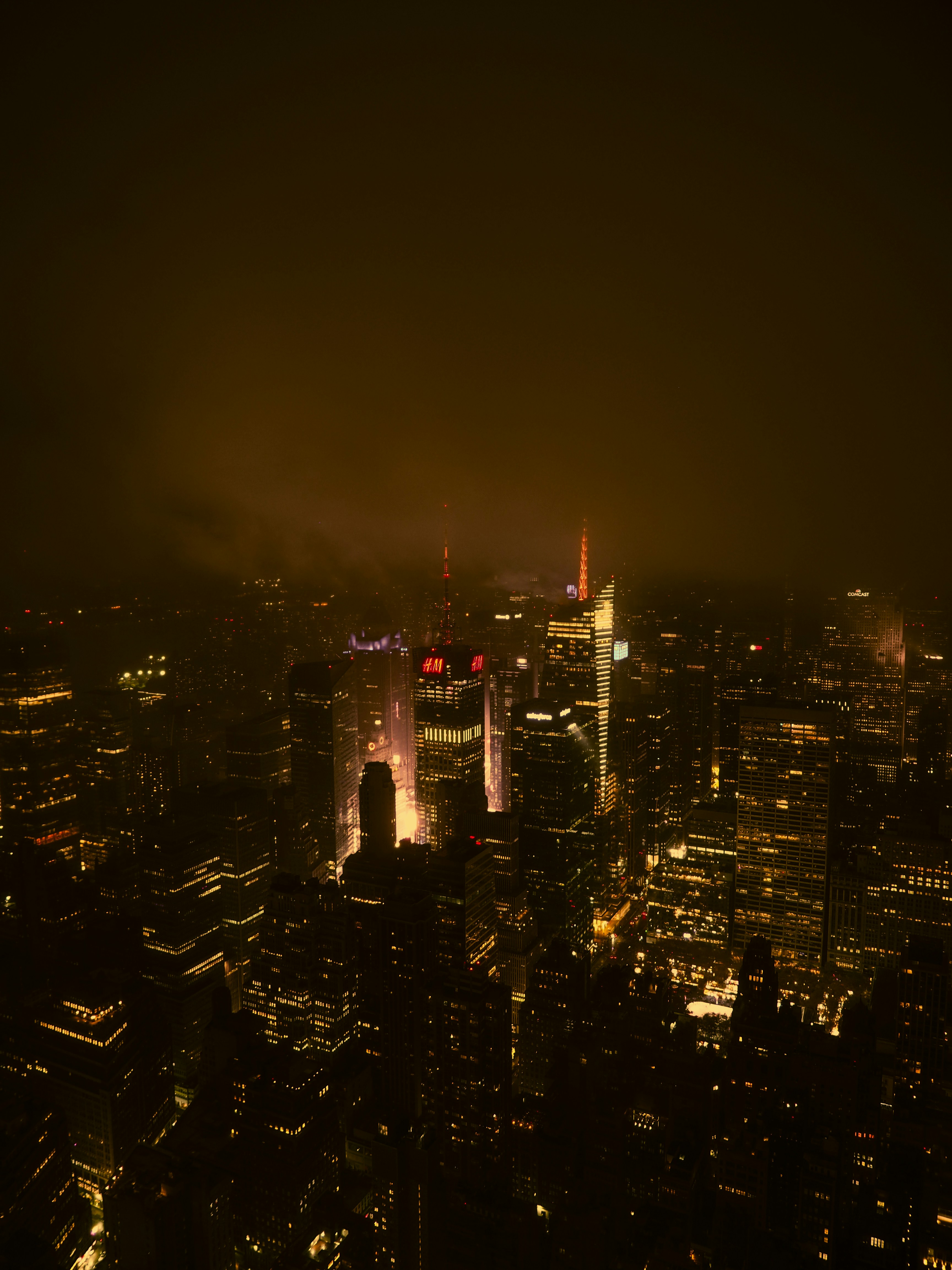 Midnight Skyline: A Sea of City Lights from Above