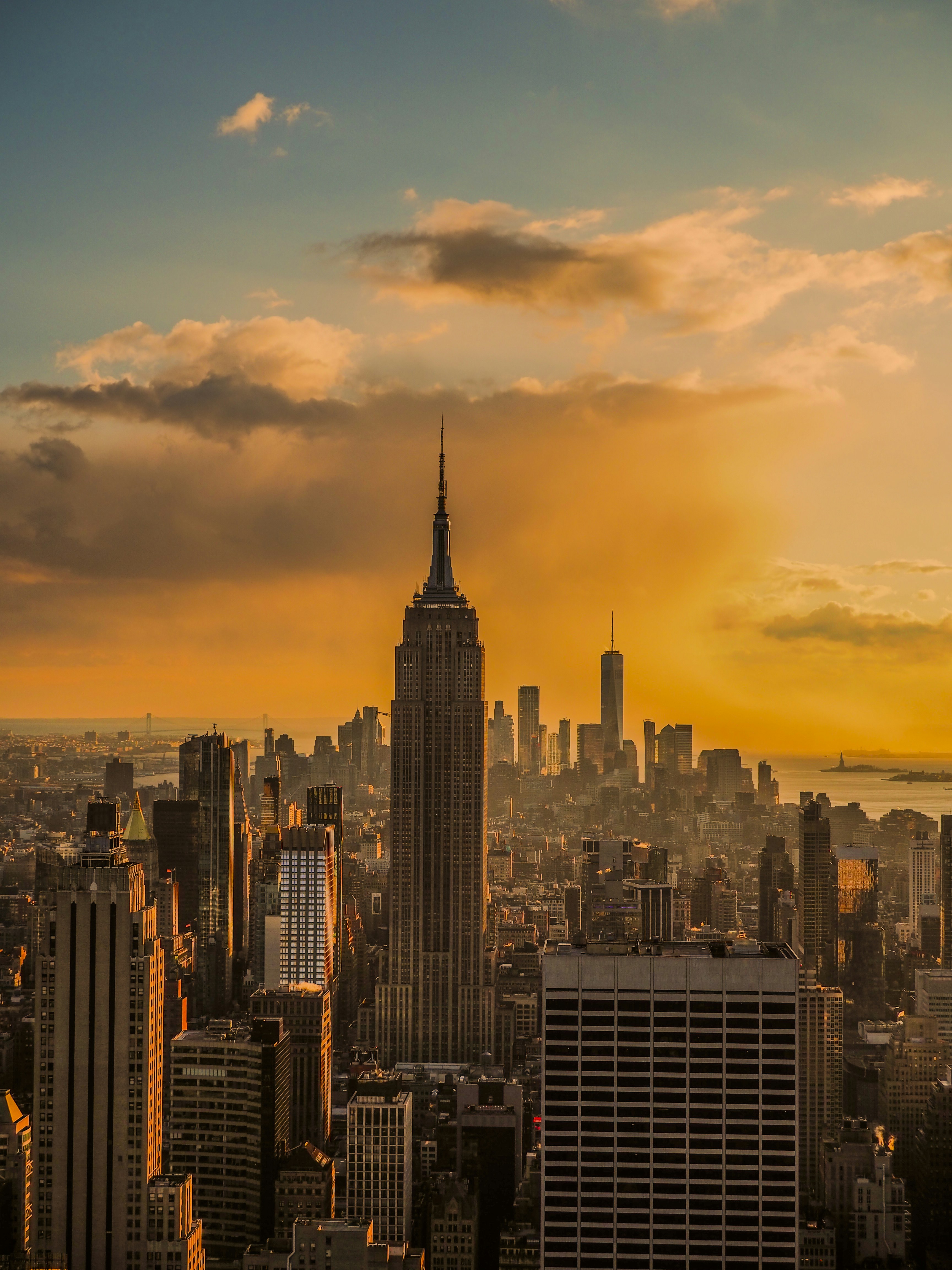Skyline in Sunset Gold: Empire State's Silhouette at Dusk
