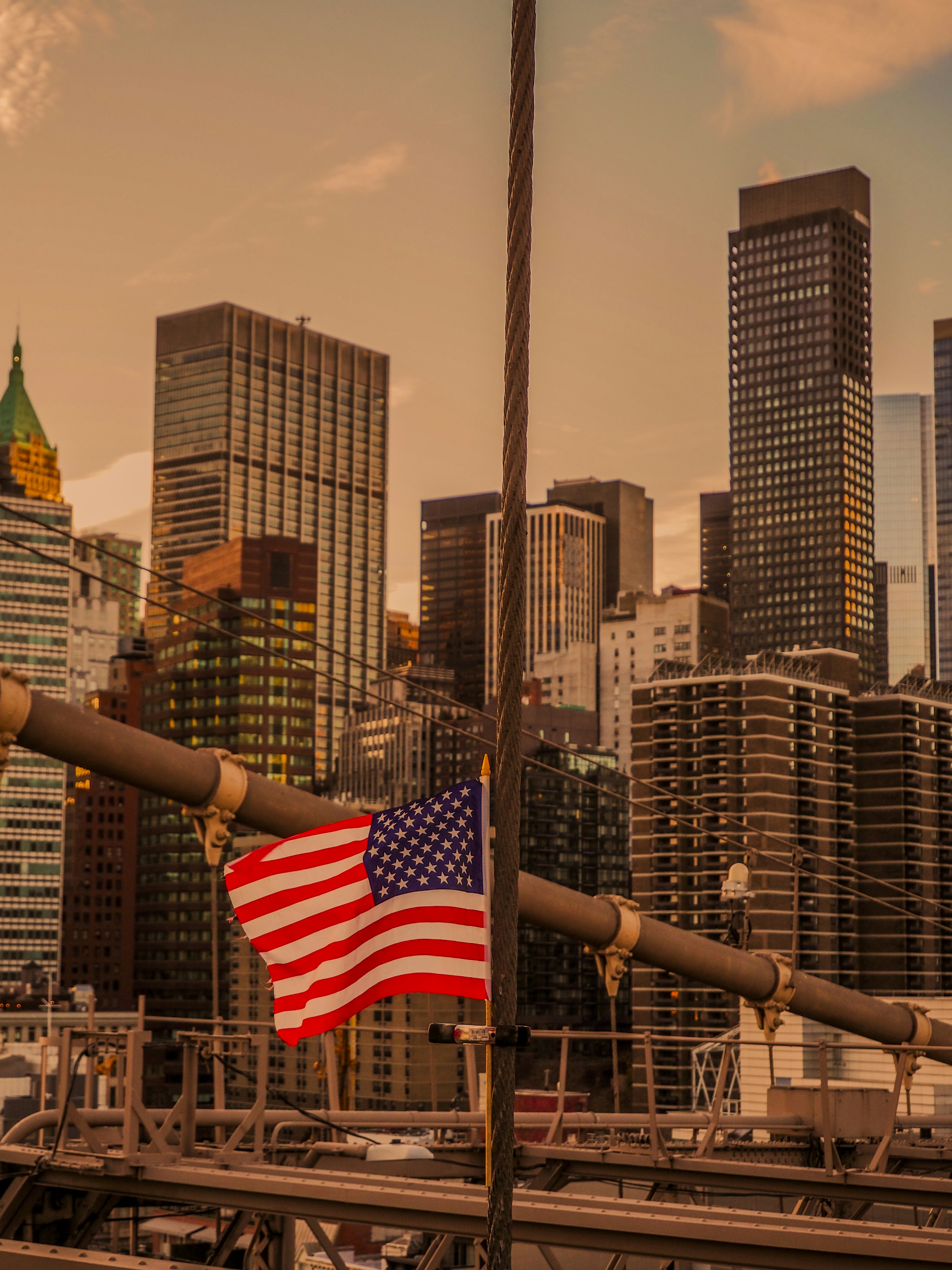 City Flag Over the Harbor: An American Moment on a Golden Hour