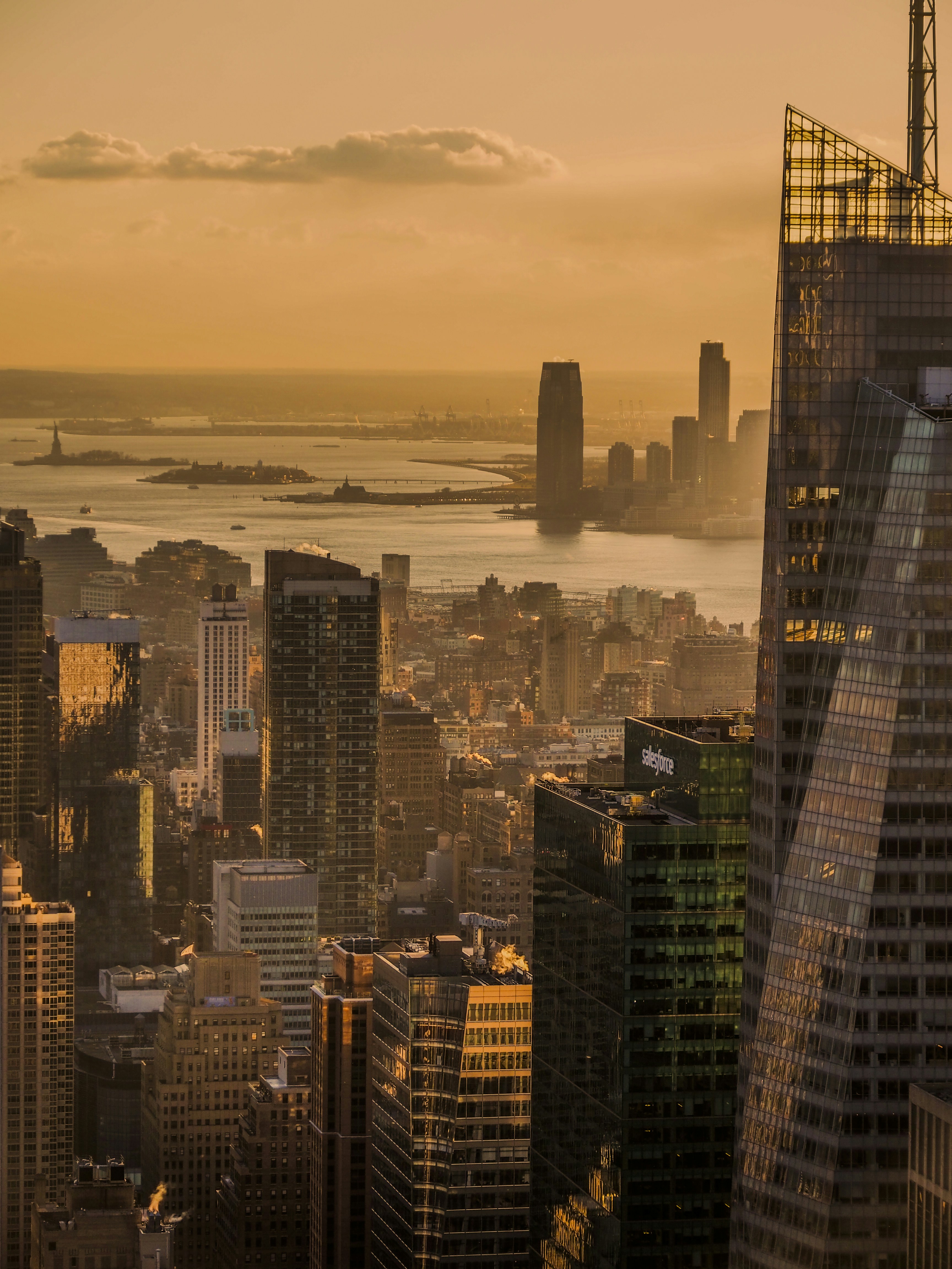 Golden Hour Above the City: Dusk Over River and Skyscrapers