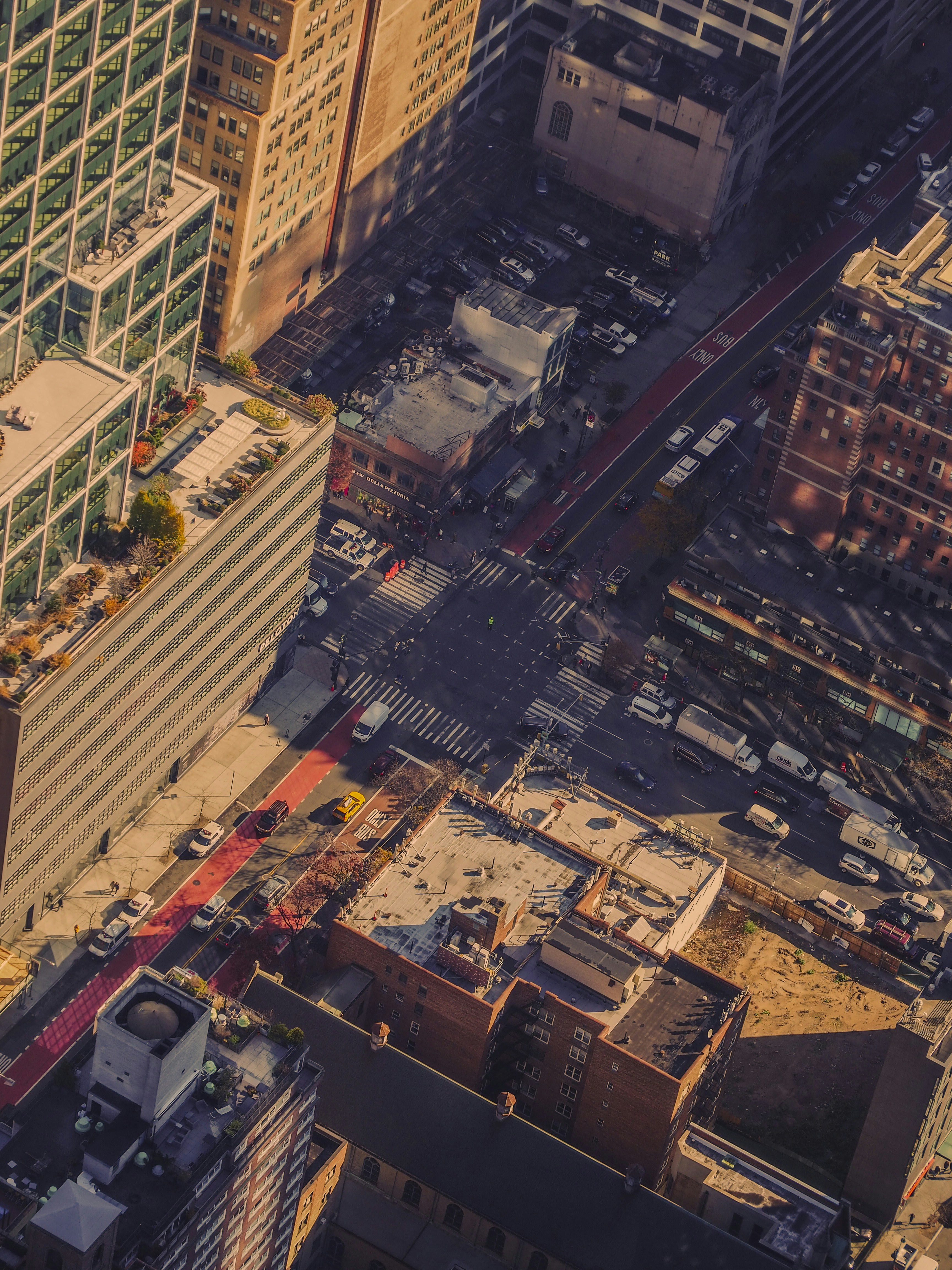 City Grid from Above: Sunset Shadow Over a Busy Avenue