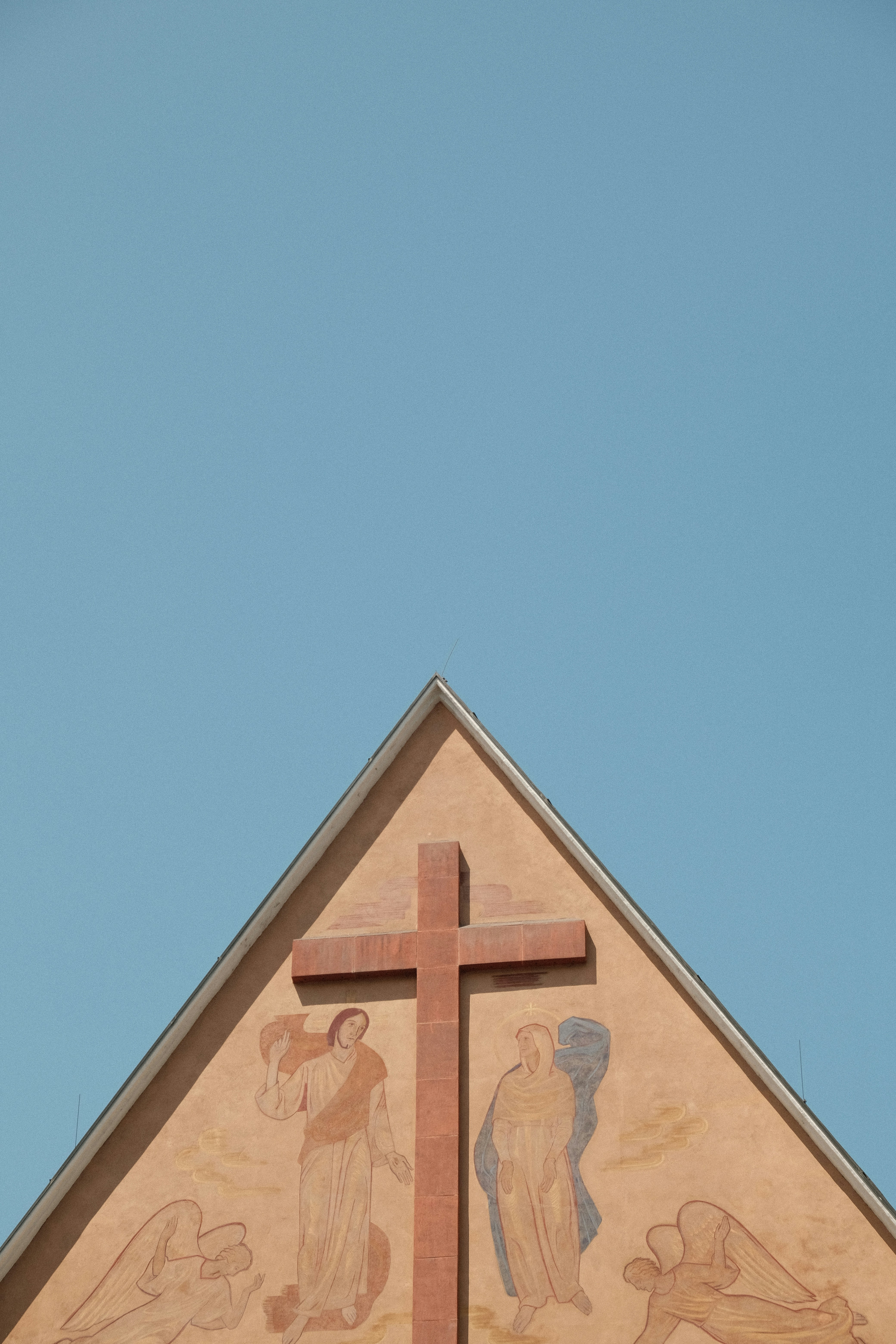 Triumph of Faith: A church facade under a clear sky