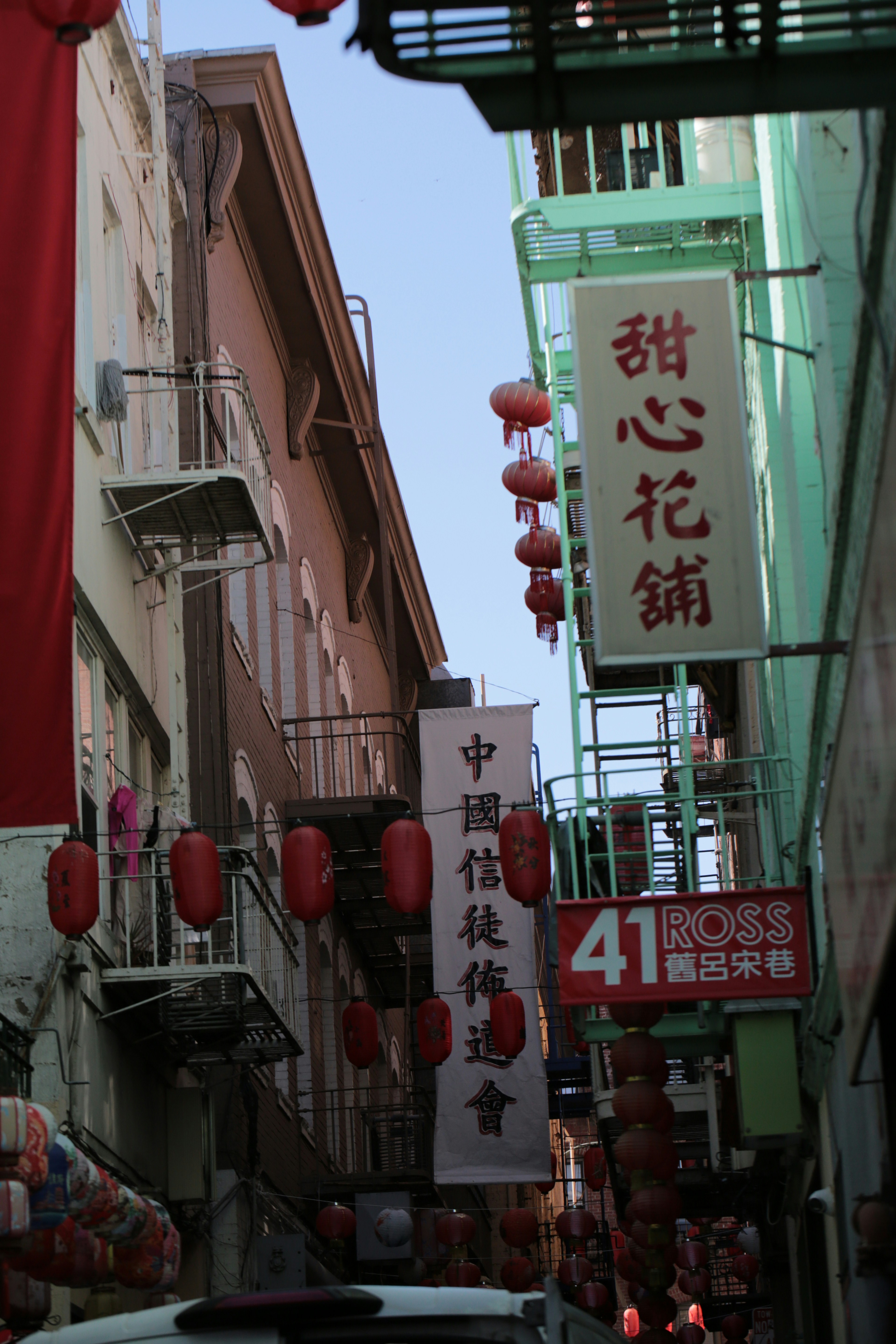 Lantern-Lined Alley of Chinatown: A Vertical Run Through Neon and Red
