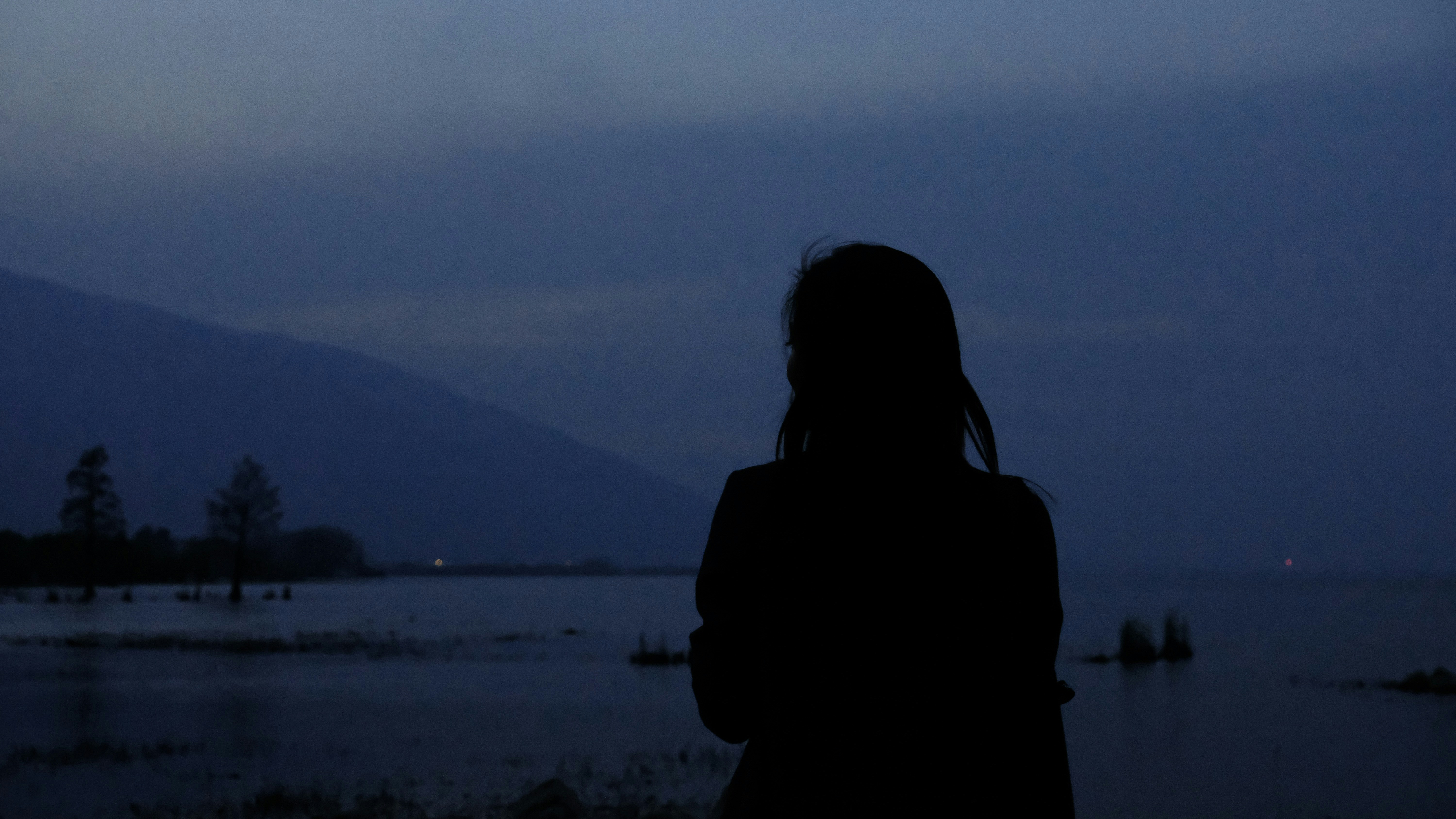 Silhouette at Dusk over a Quiet Inland