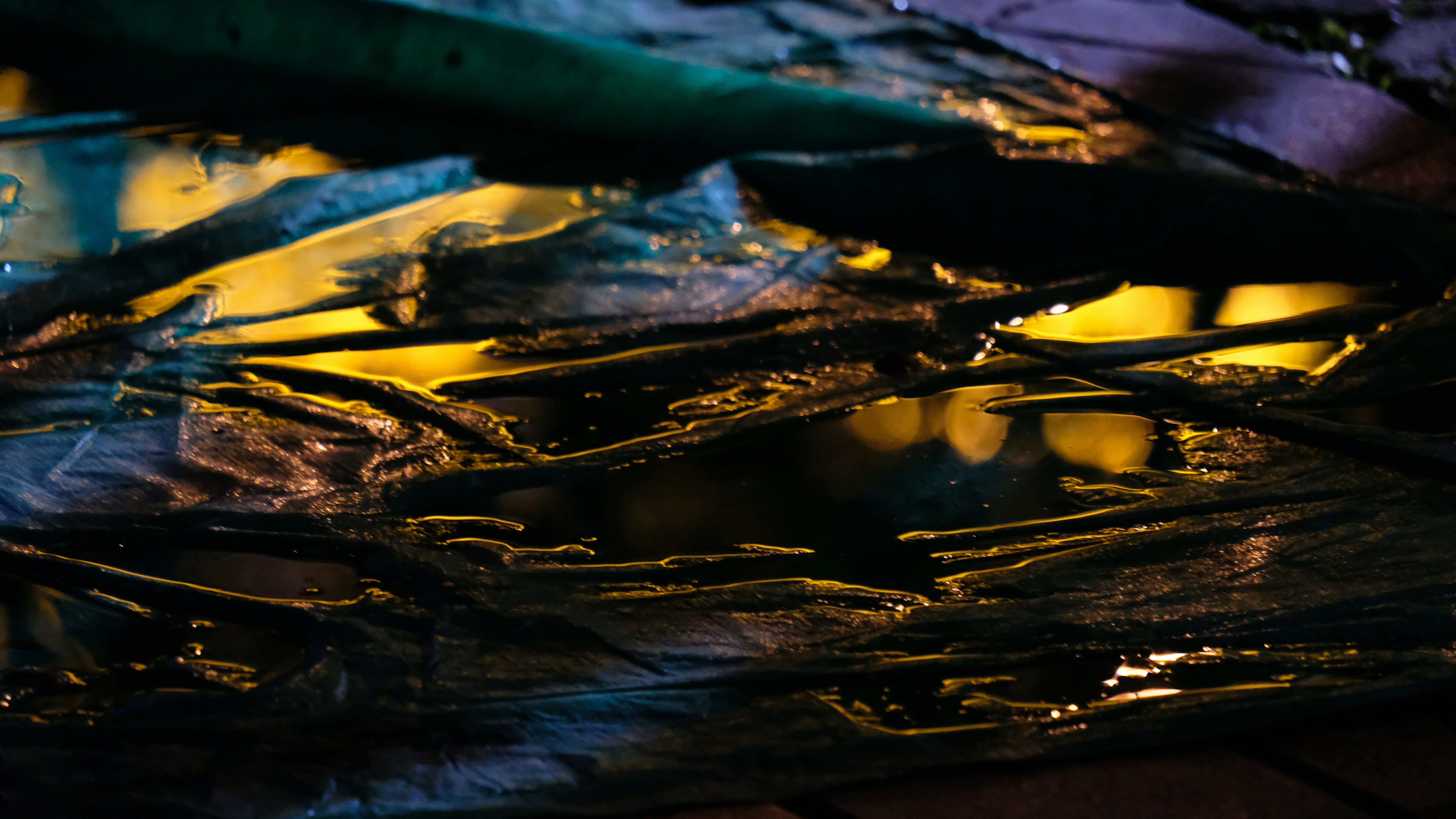 Golden Reflections Beneath Weathered Slats