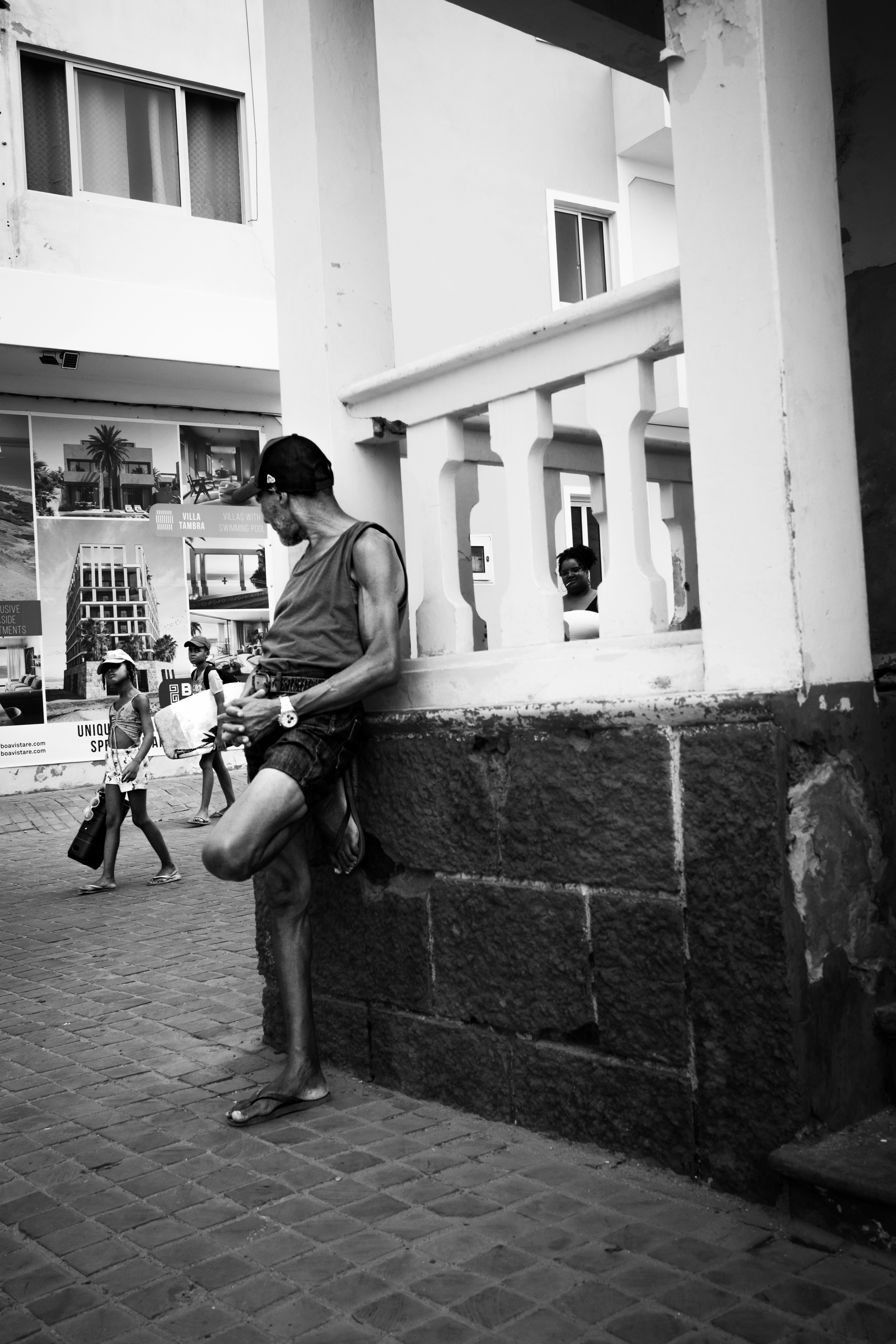 Street Encounter: A Silent Gaze by the Archway