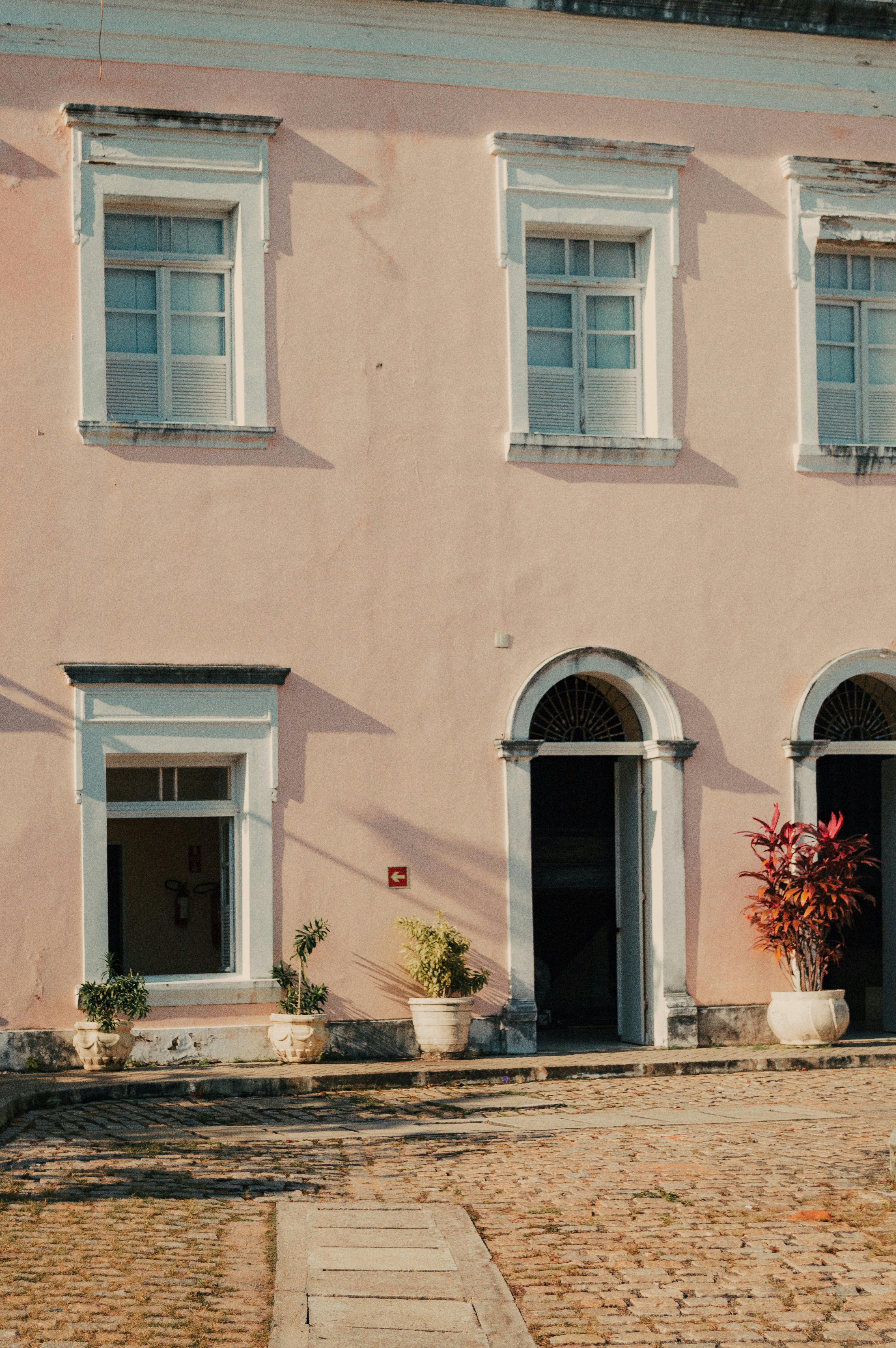 Pastel Facade with Shaded Doorways