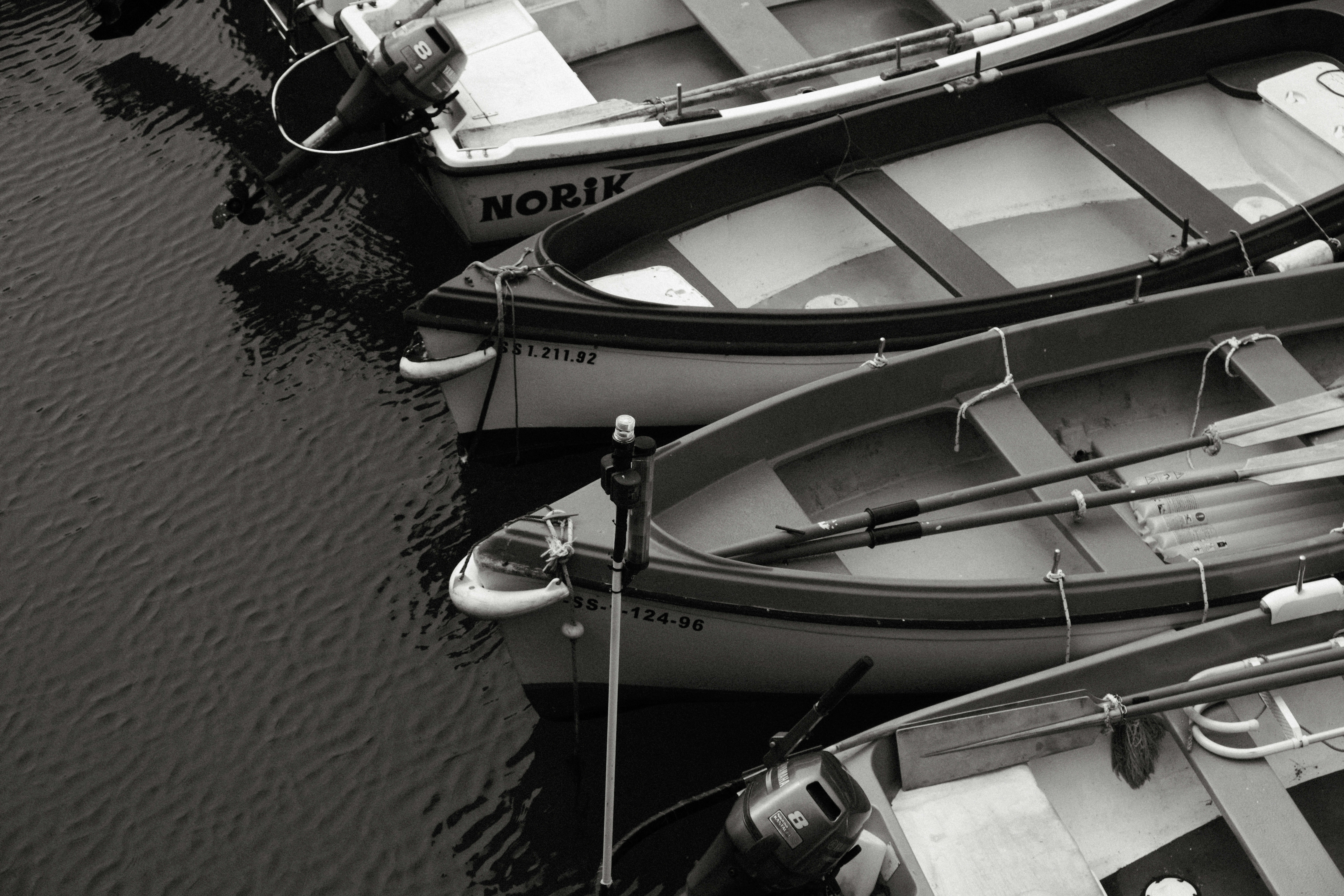 Dockside Symmetry: Boats Rest in Muted Light