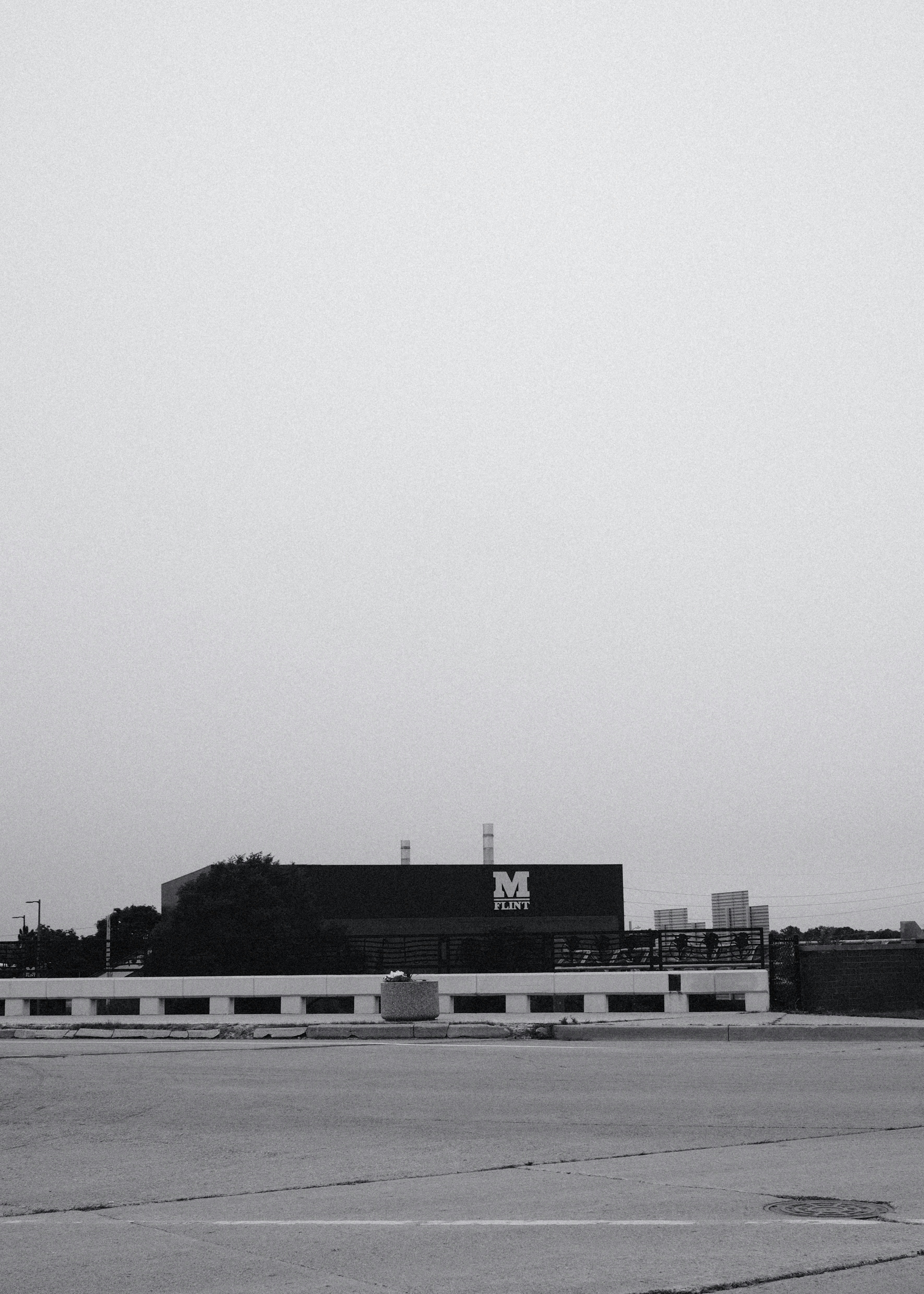Empty Lot, Moving Image: A Monochrome Moment of a Street-Facing Cinema