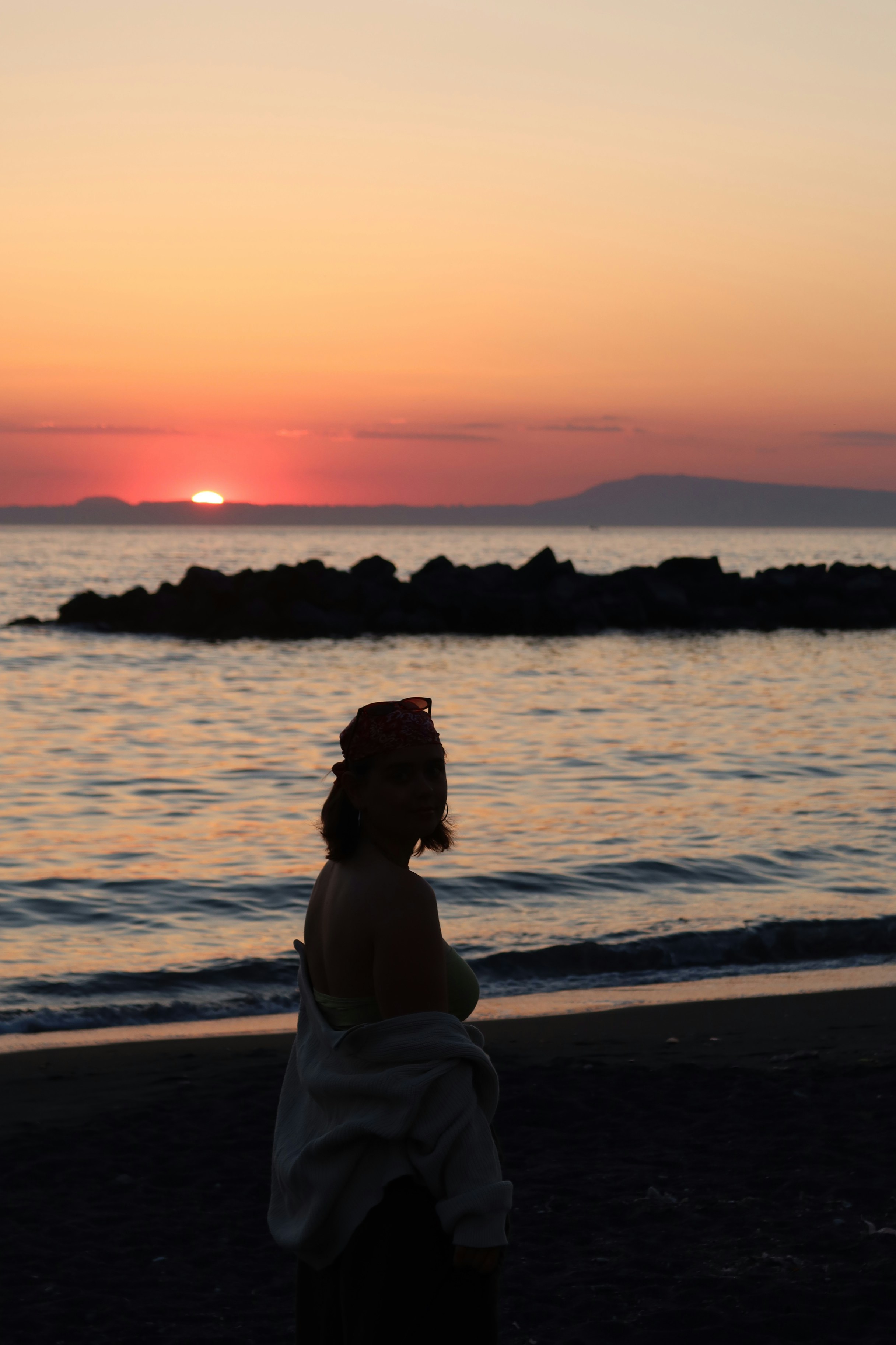 Sunset Silhouette: A Quiet Shoreline Portrait