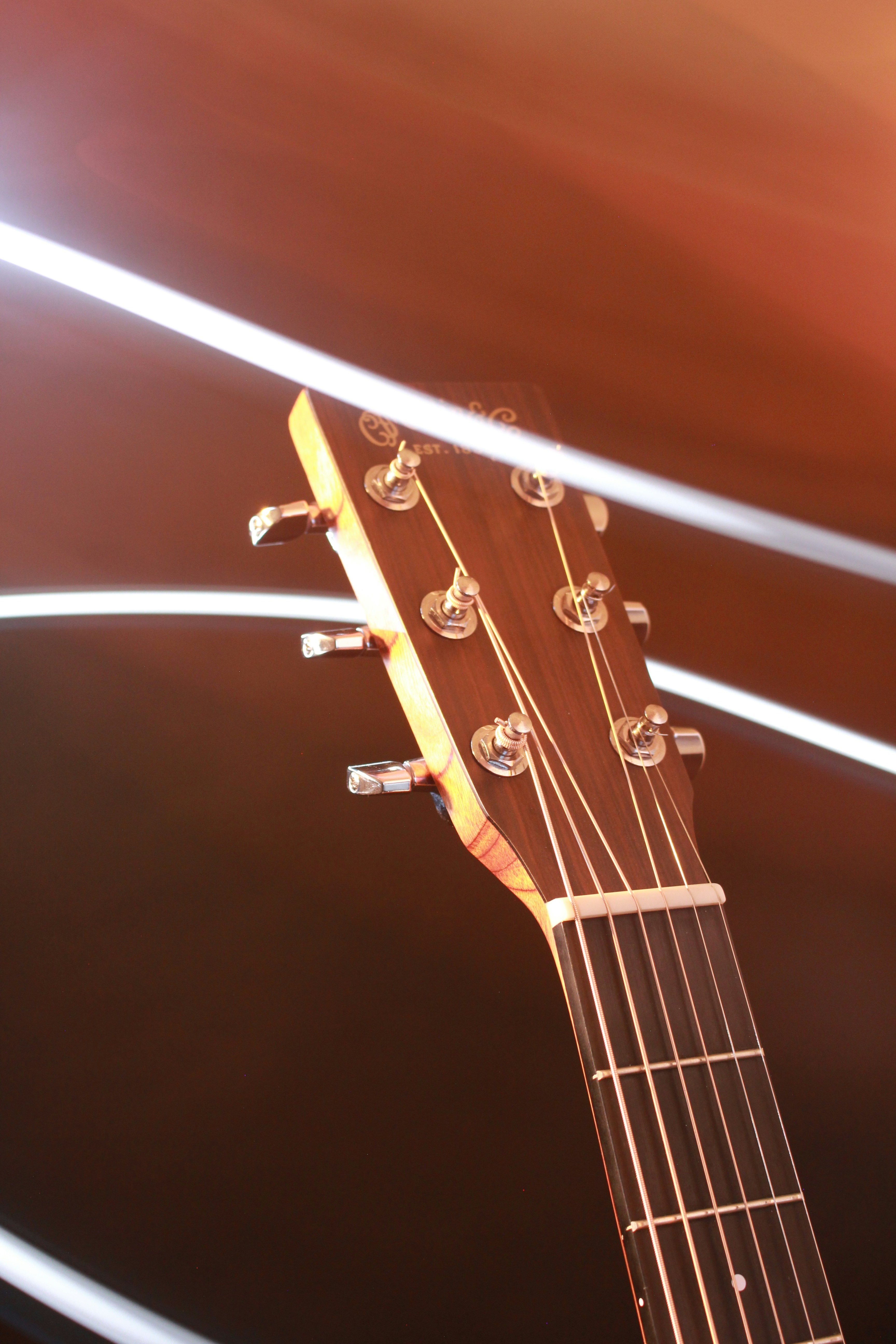 Guitar Headstock in Soft Neon Wake