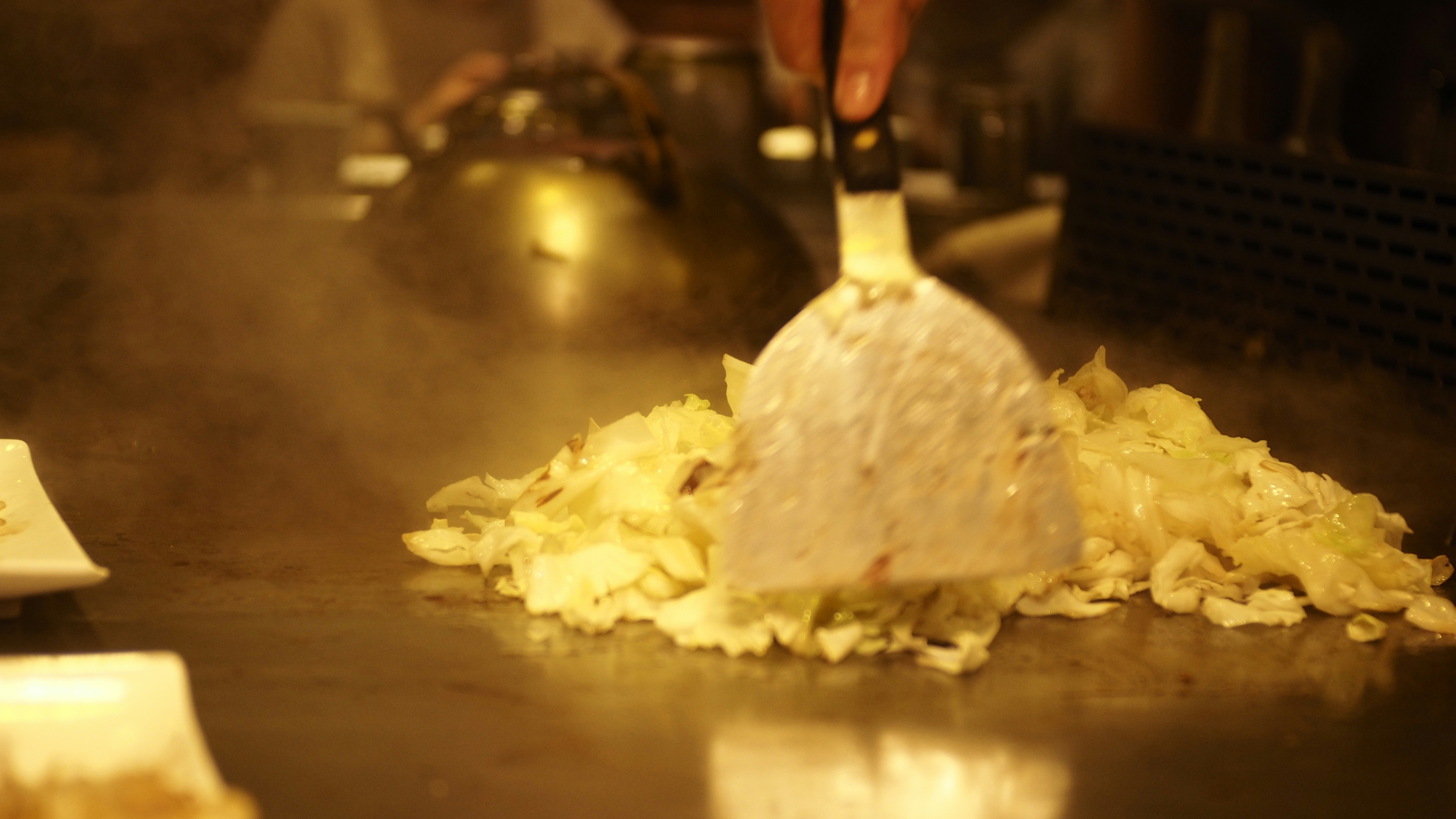 Flaming Teppanyaki Kiss: Sizzle and Scrape on a Teppan