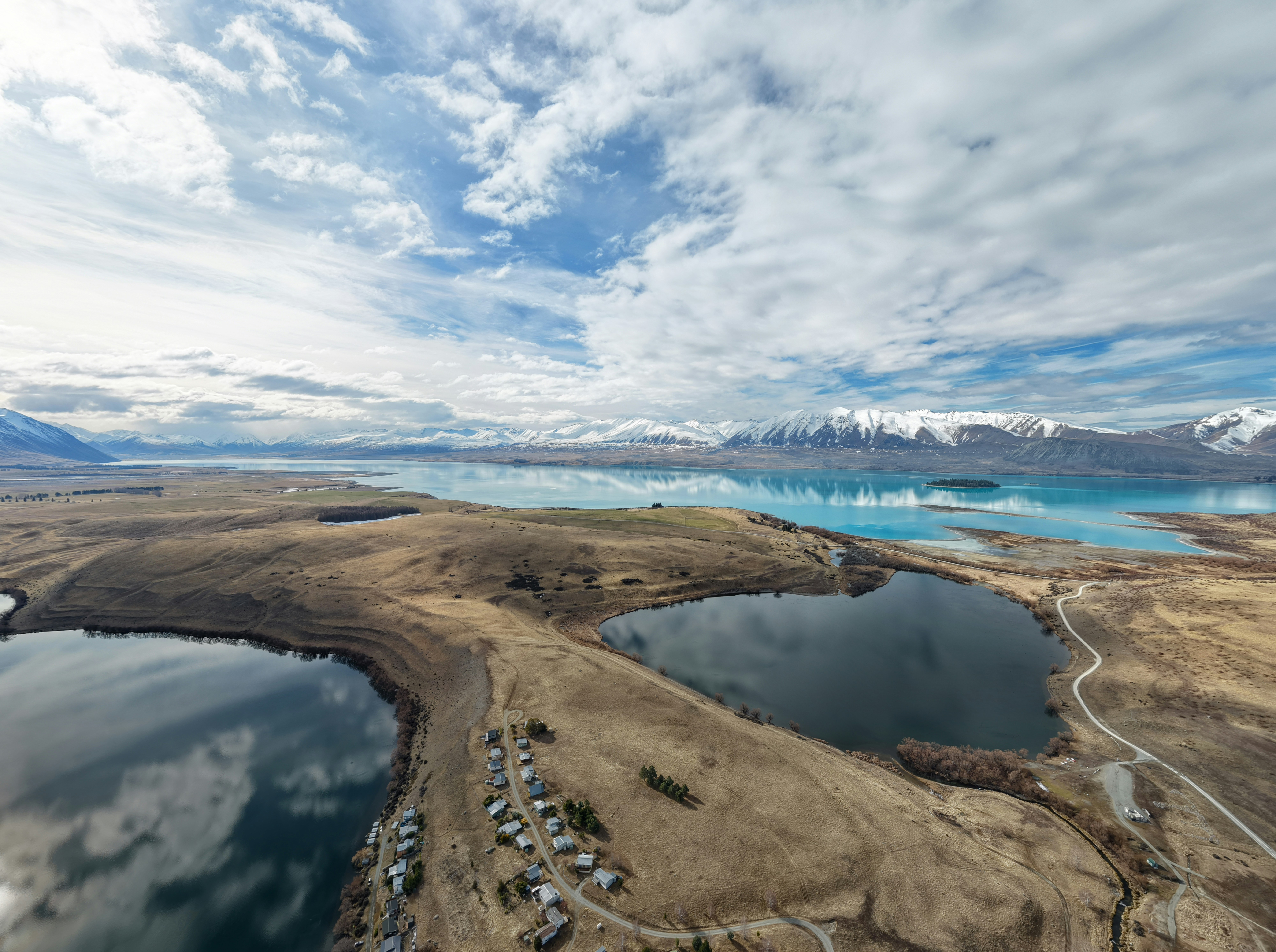 Azure Tides and Snow-kissed Ridge
